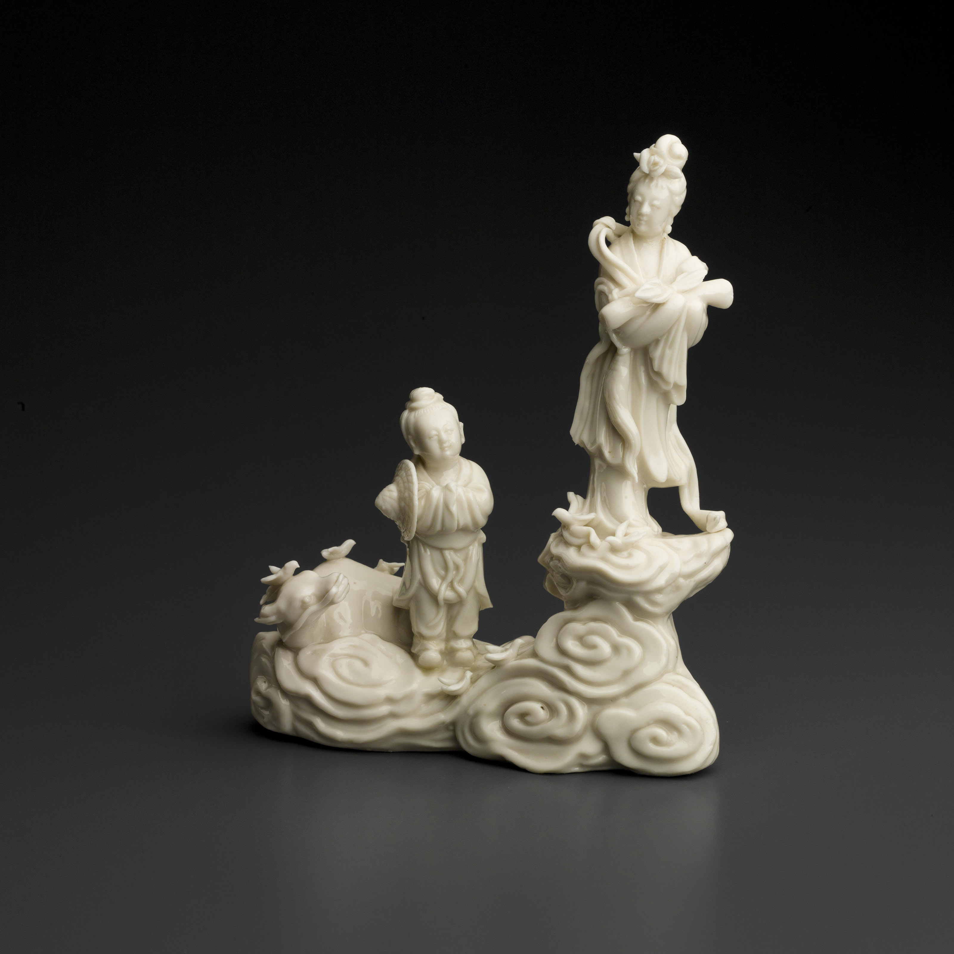 A DEHUA GROUP OF AN OXHERD AND ZHINU, THE SEWING MAIDEN, 20TH CENTURY ...