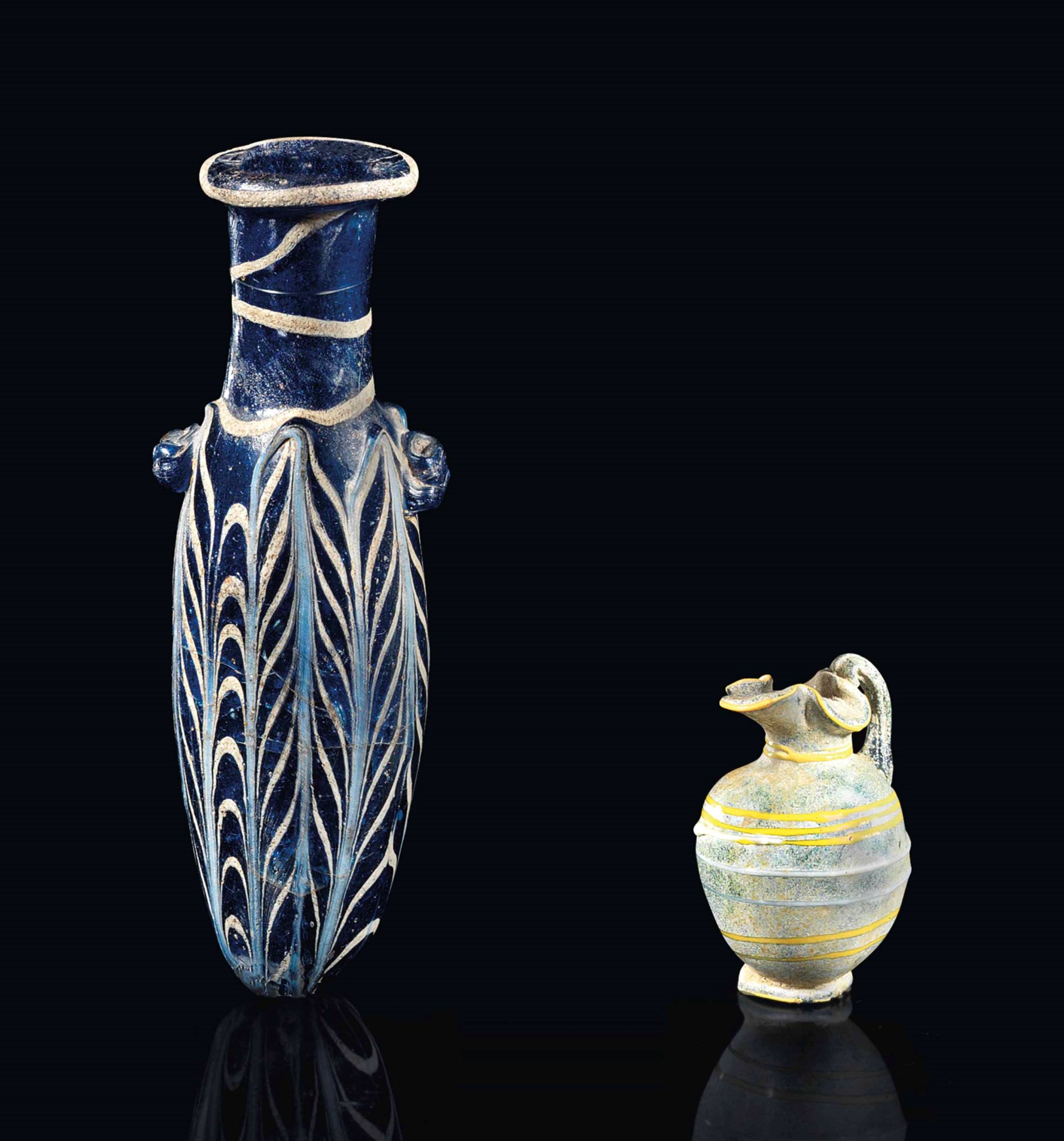A GREEK CORE-FORMED GLASS ALABASTRON AND A MINIATURE GREEK GLASS ...