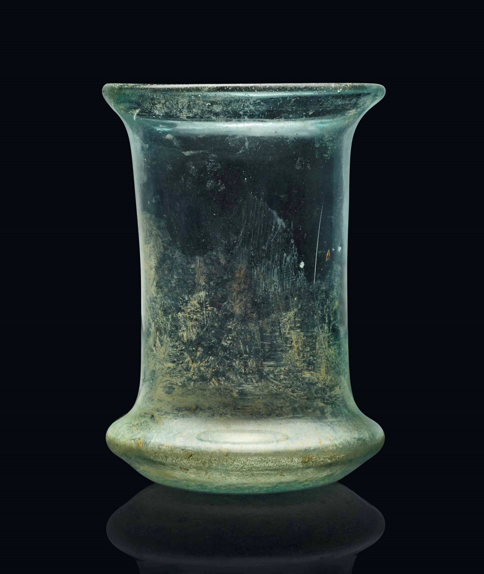 A ROMAN PALE GREEN GLASS BEAKER, CIRCA 2ND-3RD CENTURY A.D. | Christie's