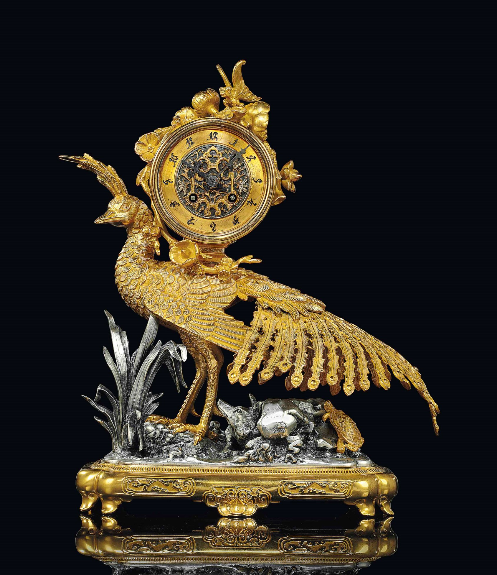A FRENCH 'JAPONISME' GILT AND SILVERED BRONZE CLOCK, LATE 19TH CENTURY ...