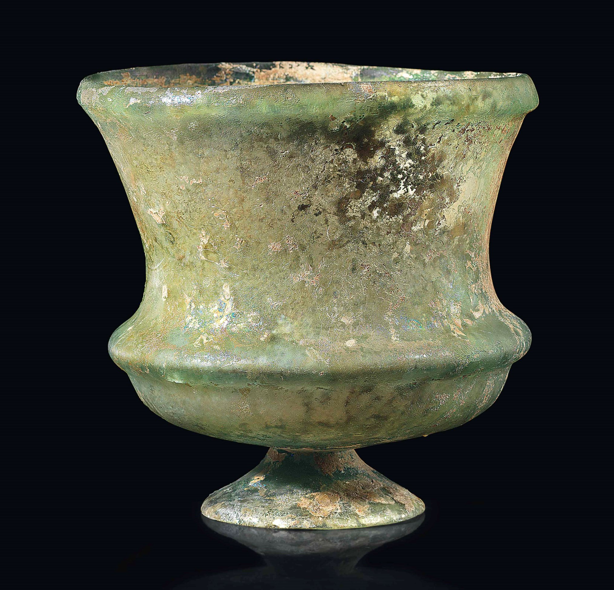 A ROMAN GREEN GLASS CARCHESIUM, CIRCA 1ST CENTURY A.D. | Christie's
