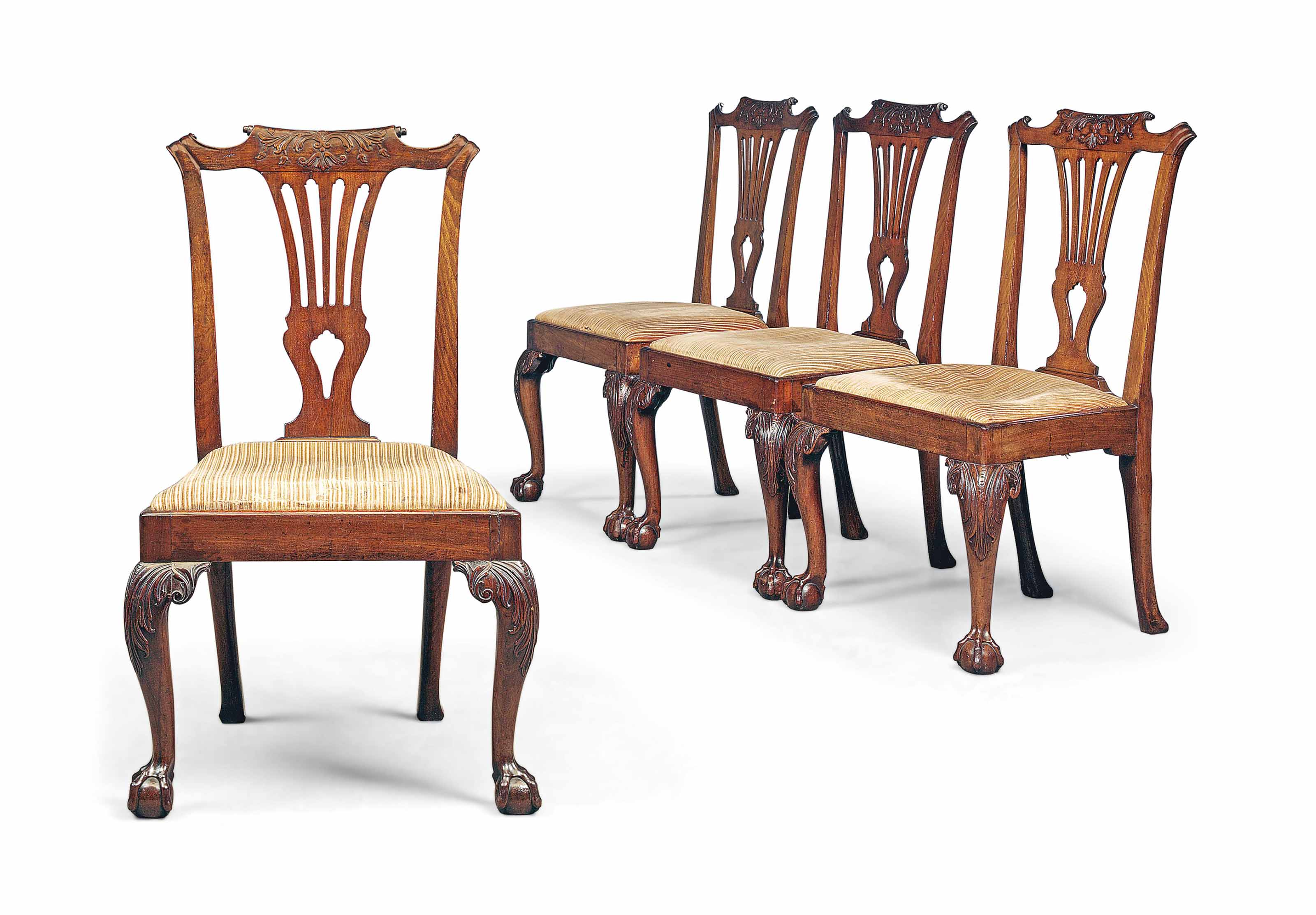 A SET OF FOUR GEORGE II MAHOGANY DINING-CHAIRS
