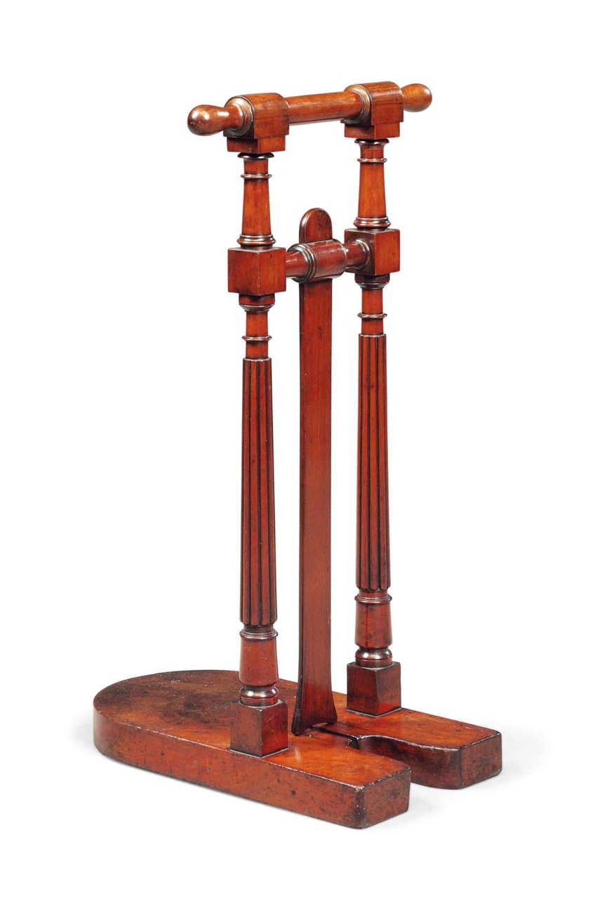AN EARLY VICTORIAN MAHOGANY BOOT JACK, IN THE MANNER OF GILLOWS, CIRCA ...