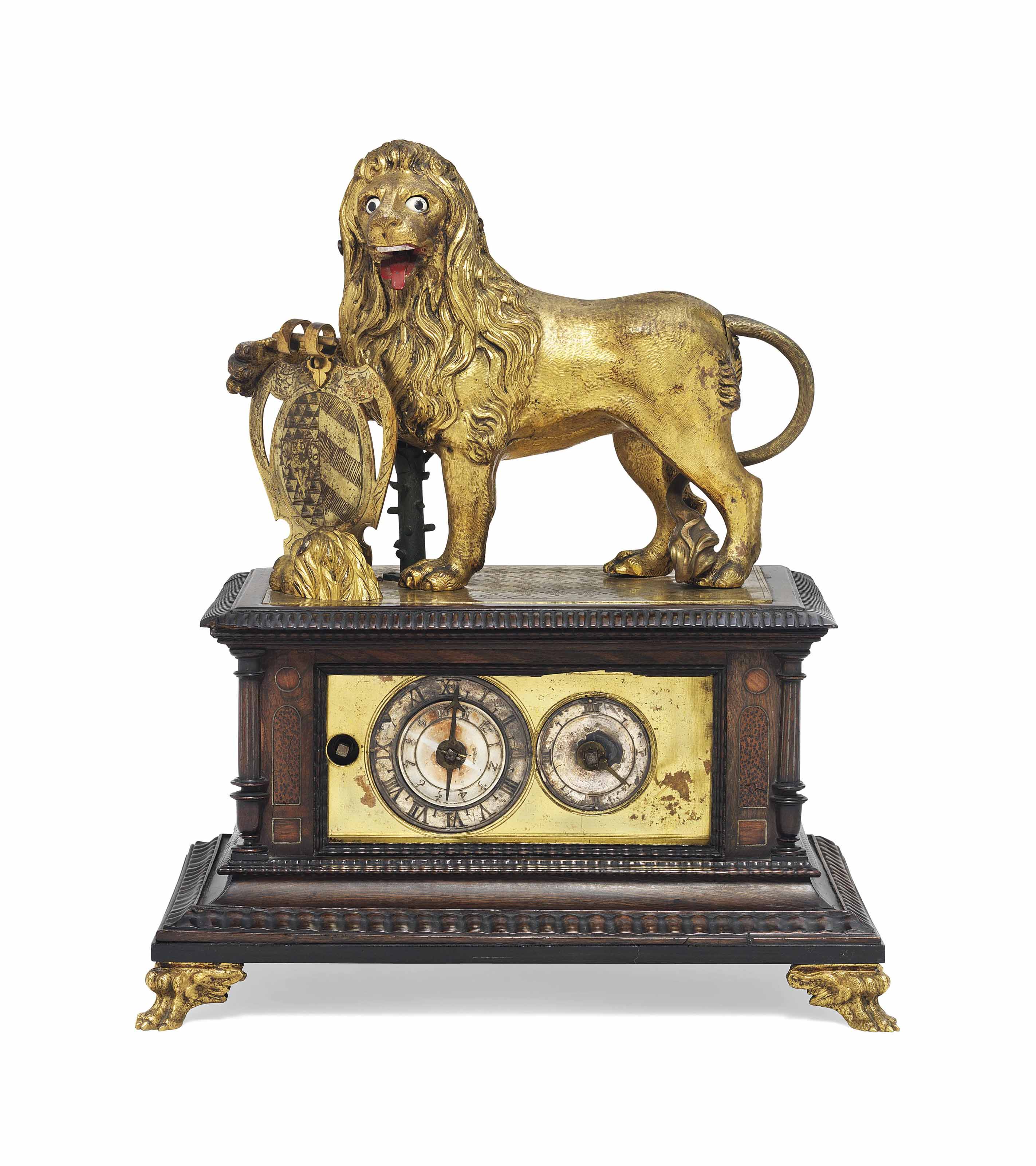 A SOUTH GERMAN GILT-BRONZE AND PARQUETRY AUTOMATON LION TABLE CLOCK