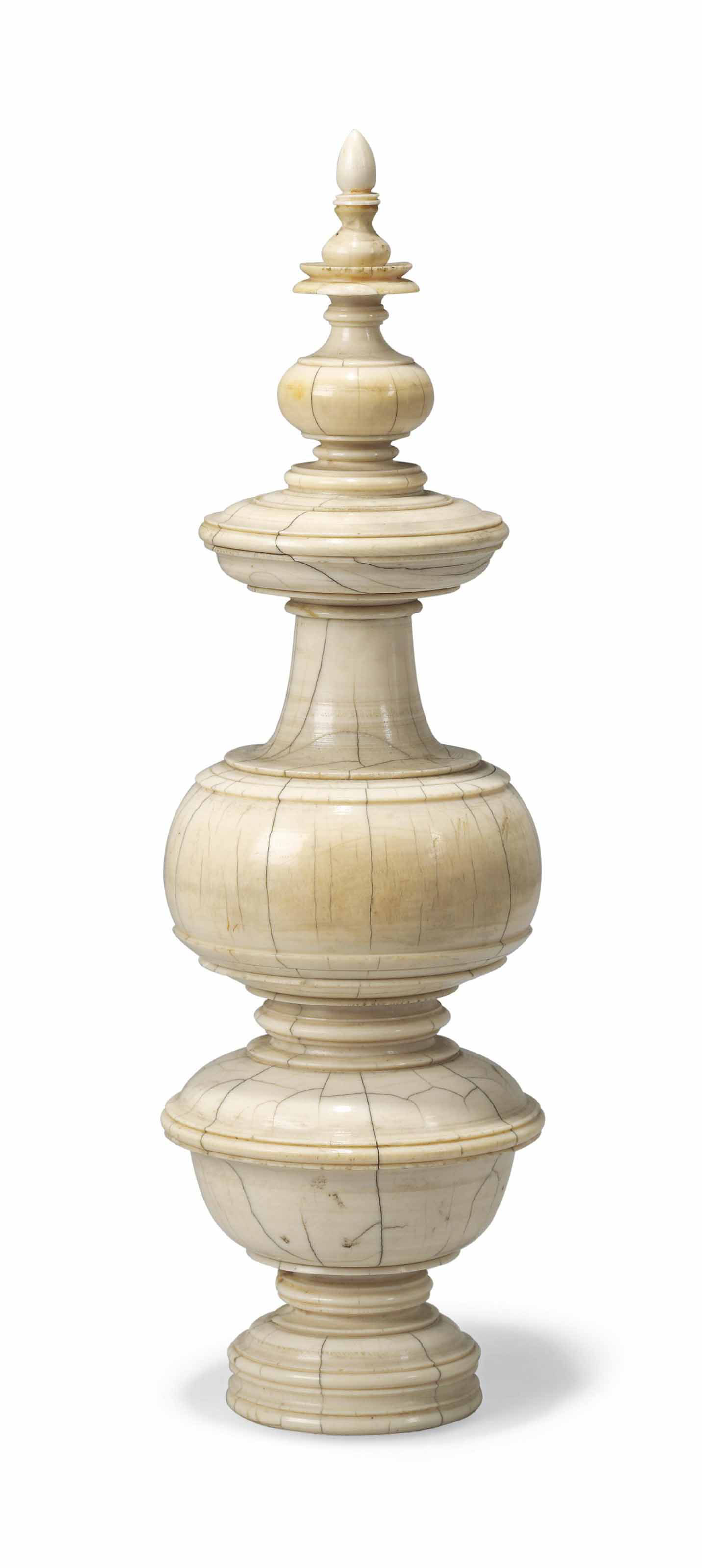 A TURNED IVORY ORNAMENT