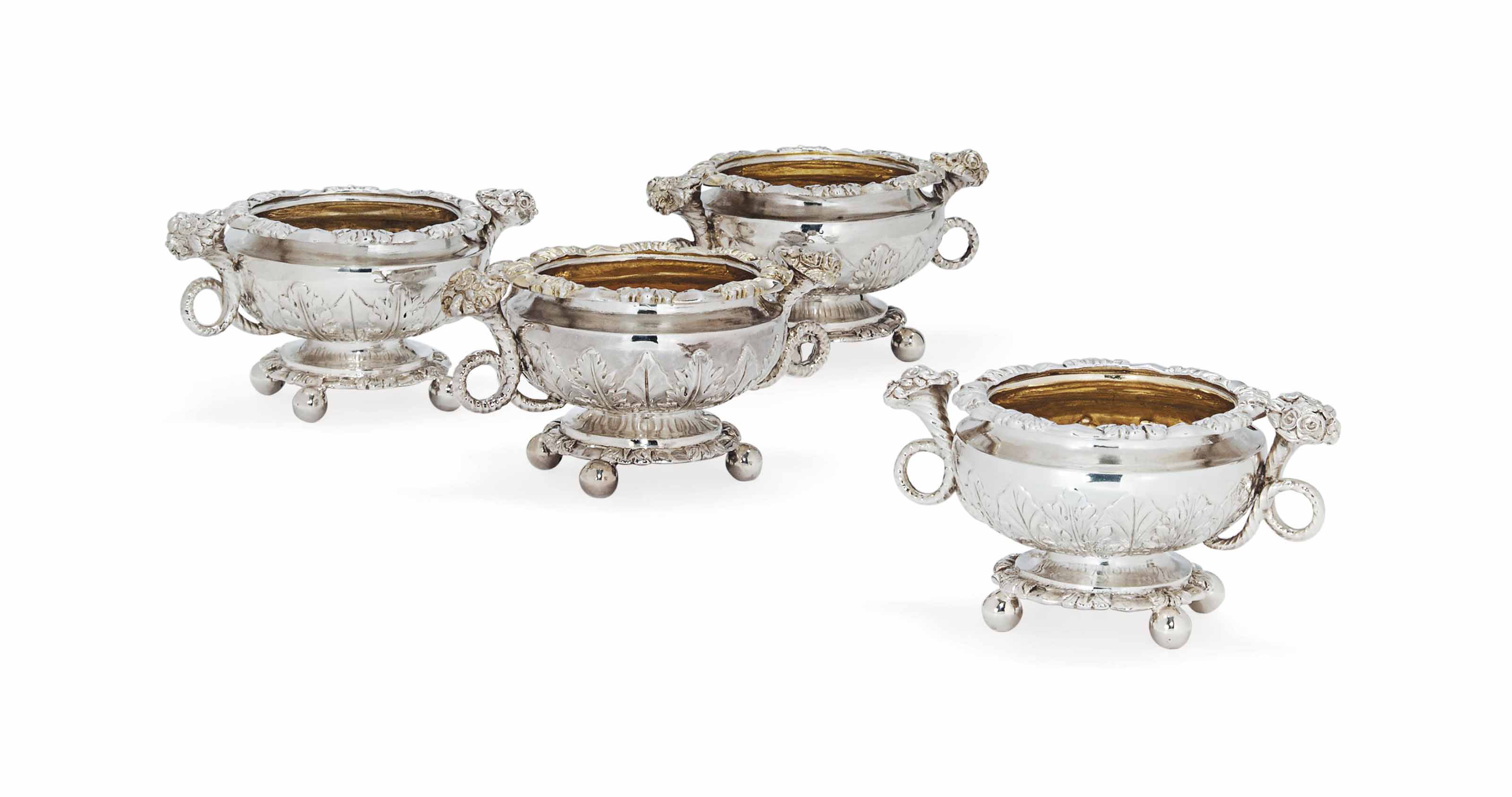 A MATCHED SET OF FOUR GEORGE III SILVER CAULDRON SALTS