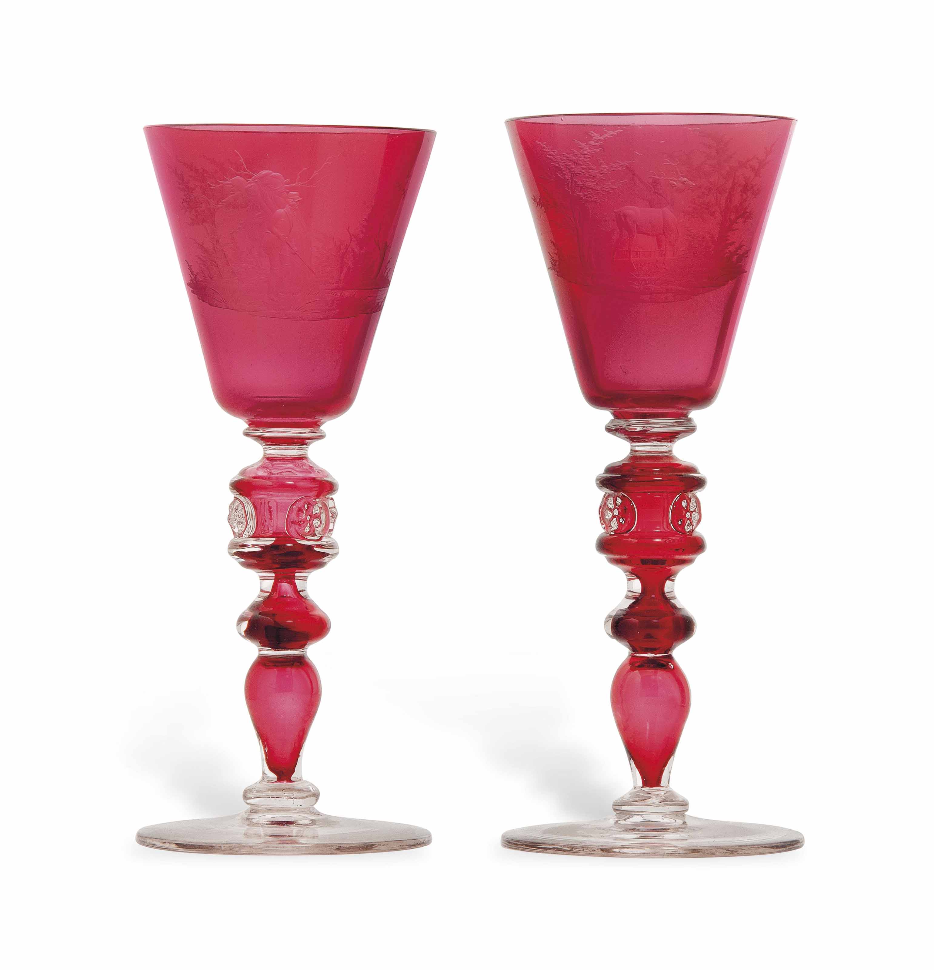 A PAIR OF BOHEMIAN RUBY-STAINED ENGRAVED GLASS GOBLETS