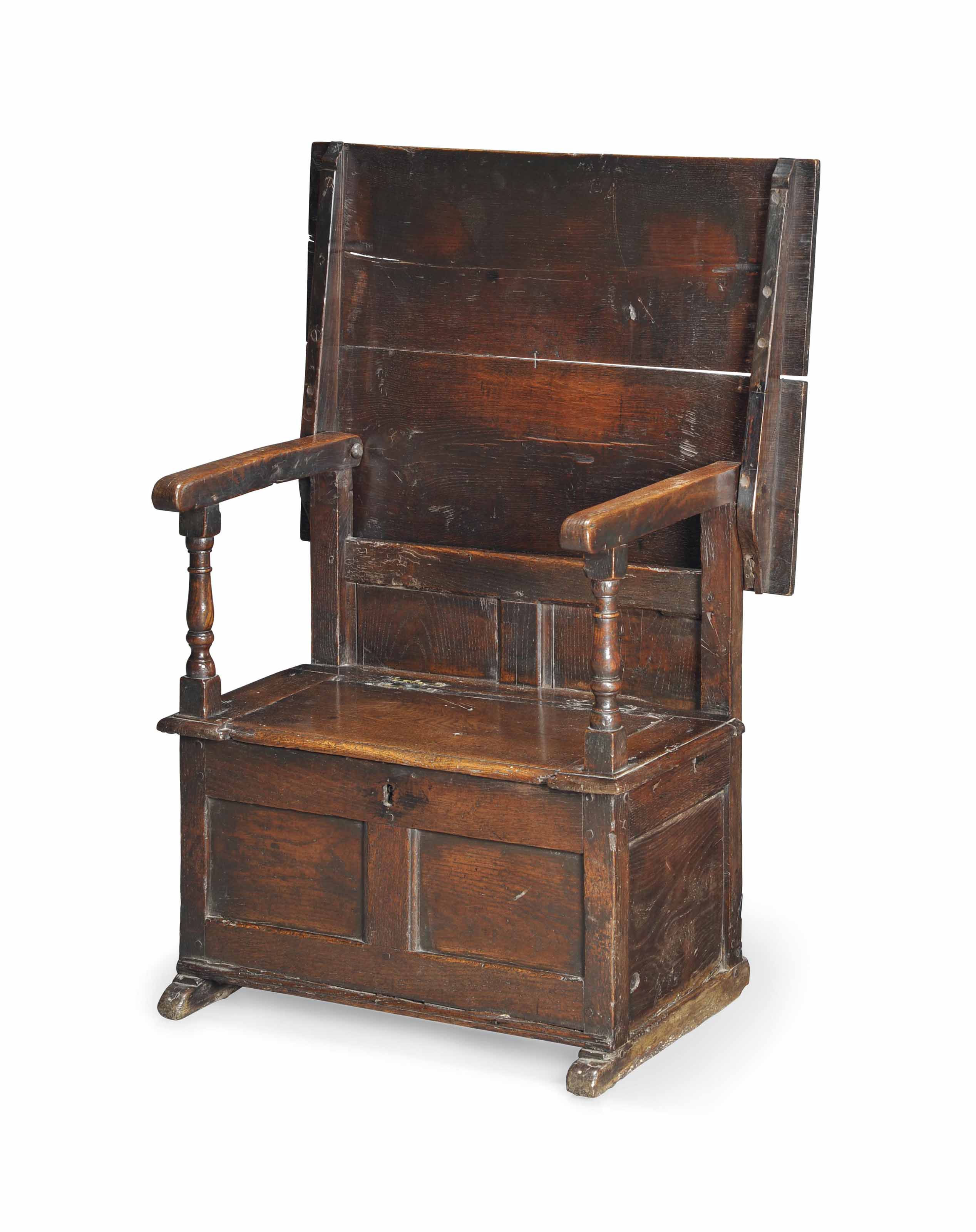 A SMALL CHARLES II OAK BOX-SEAT SETTLE / TABLE
