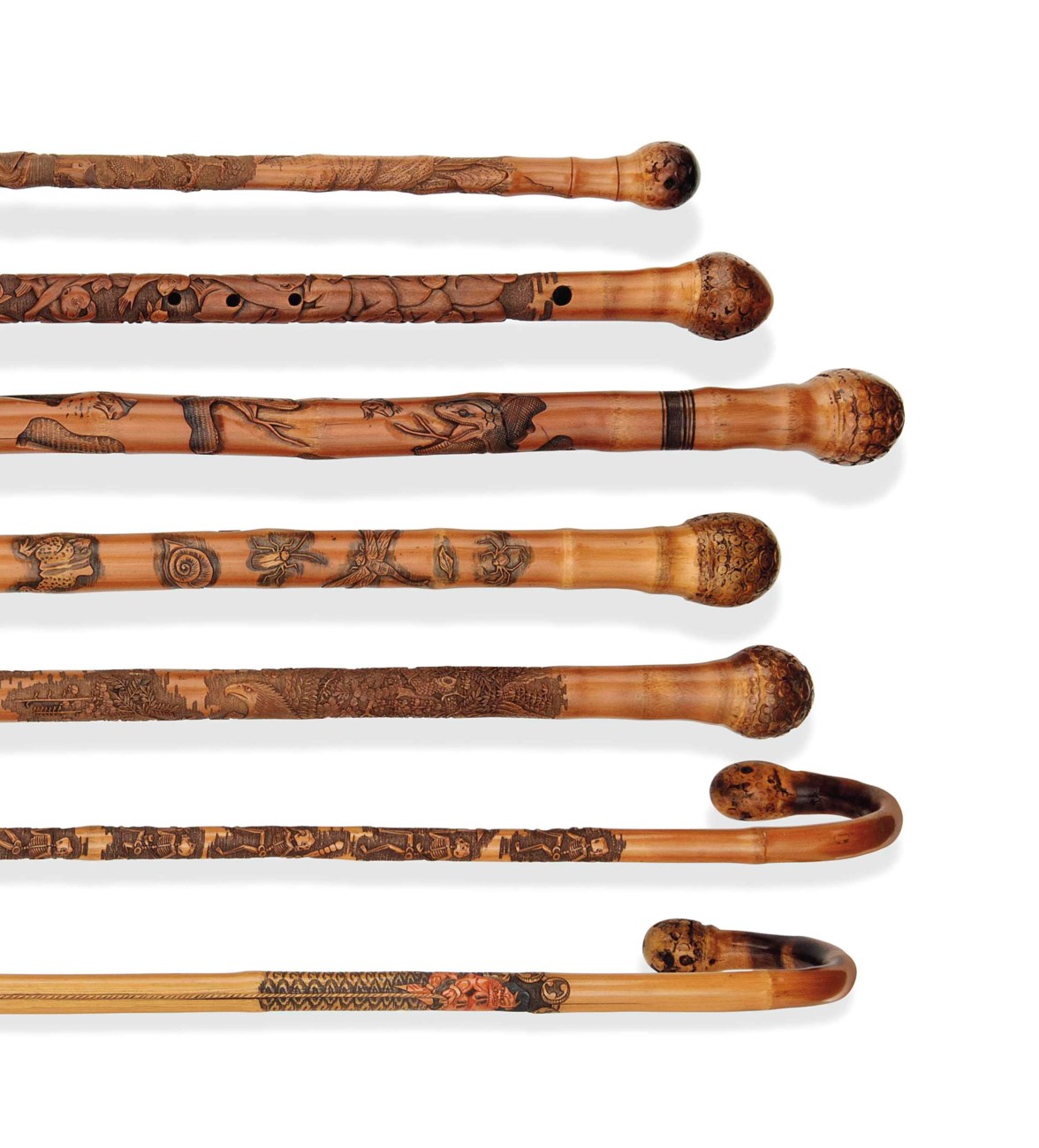 A GROUP OF SEVEN JAPANESE BAMBOO WALKING STICKS, MEIJI PERIOD, LATE ...