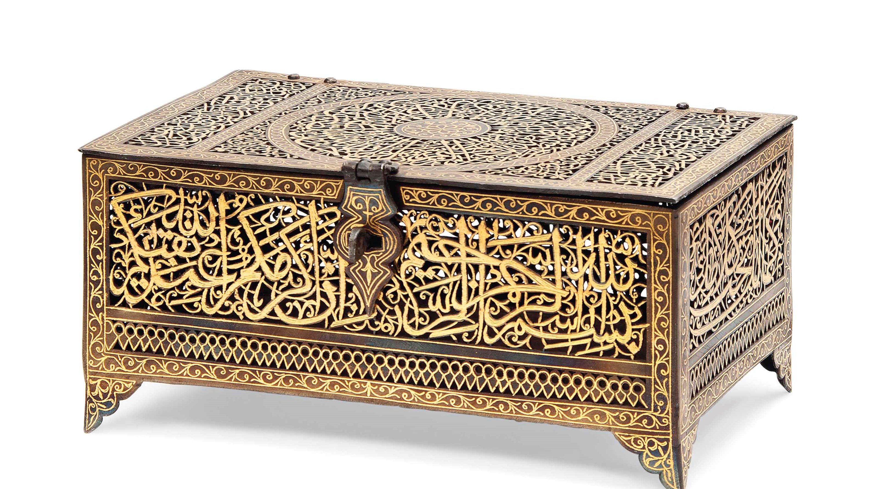 A CALLIGRAPHIC GOLD-DAMASCENED OPENWORK STEEL BOX | Christie's