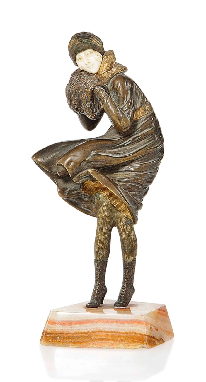 A DEMETRE H. CHIPARUS (188801950) PATINATED AND GILT-BRONZE AND IVORY ...