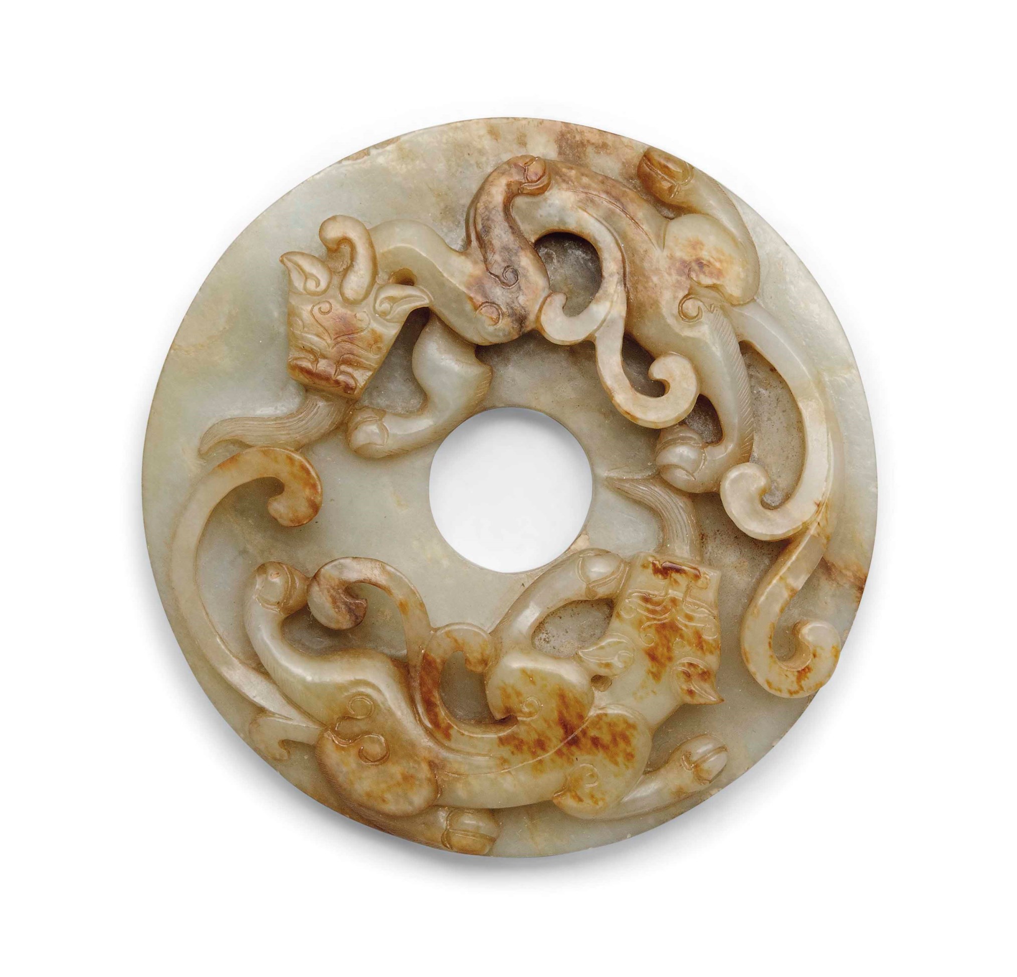 A PALE CELADON AND RUSSET JADE 'CHILONG' DISC, BI, MING DYNASTY (1368 ...