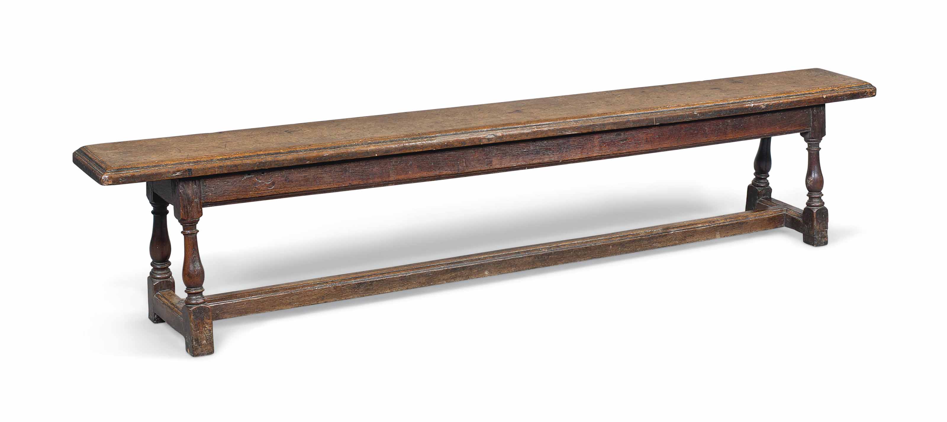 A CHARLES II OAK LONG BENCH