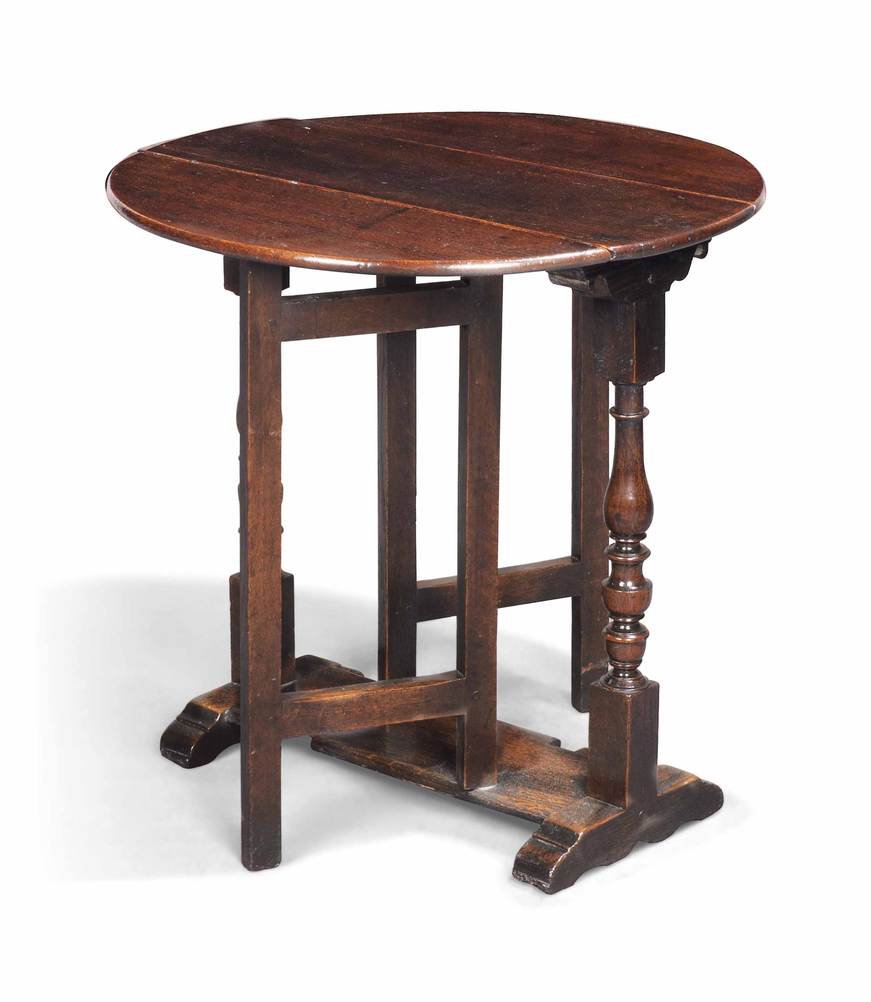 A CHARLES II OAK GATE-LEG TABLE