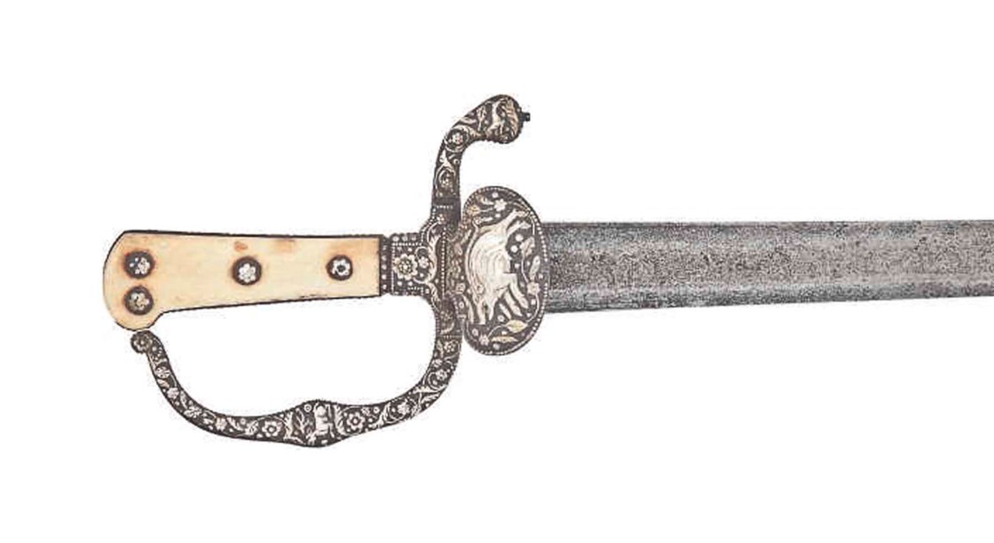 A GERMAN HUNTING HANGER WITH SILVER-ENCRUSTED DECORATION, EARLY 17TH ...