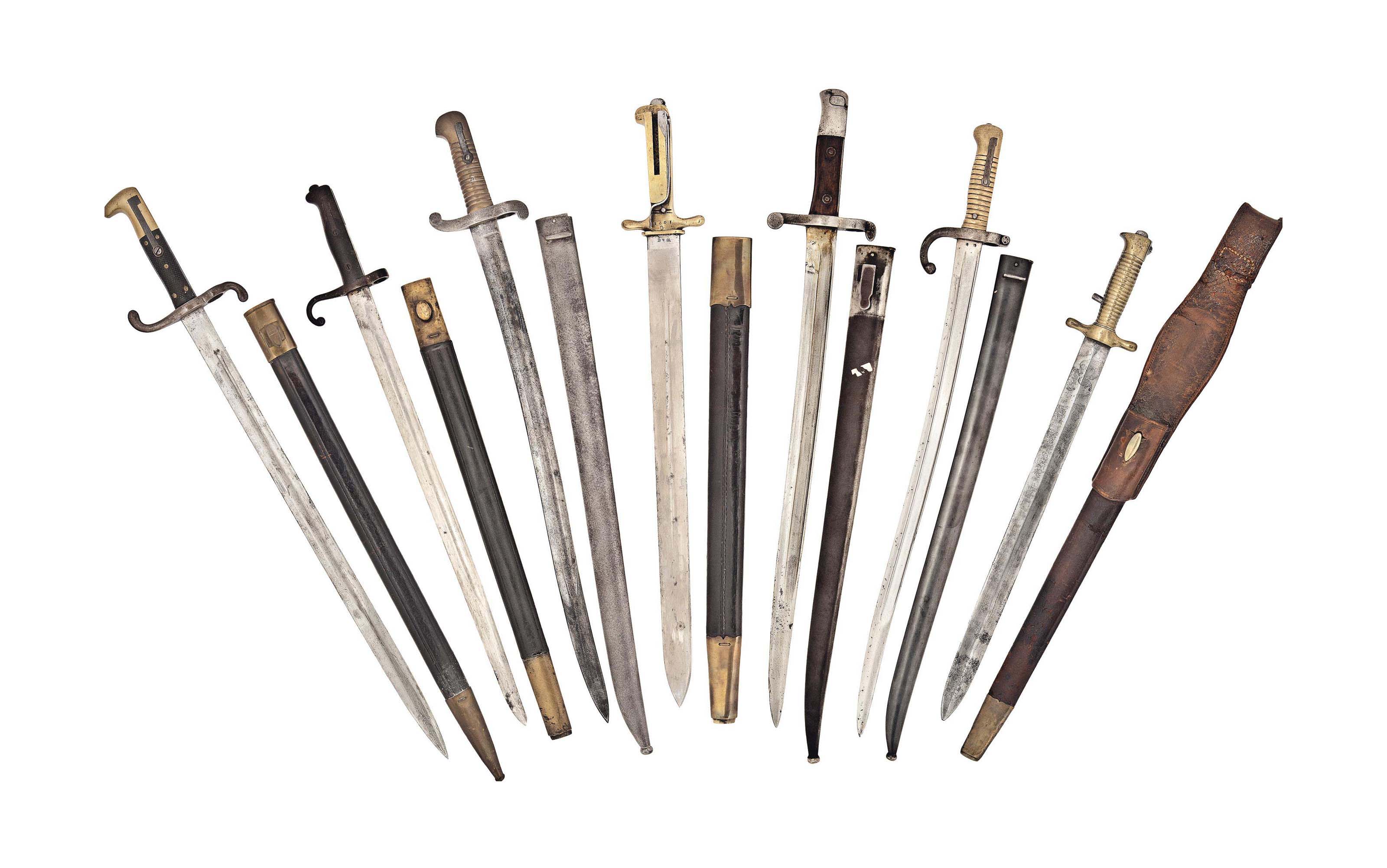 A GROUP OF TWENTY SWORD BAYONETS