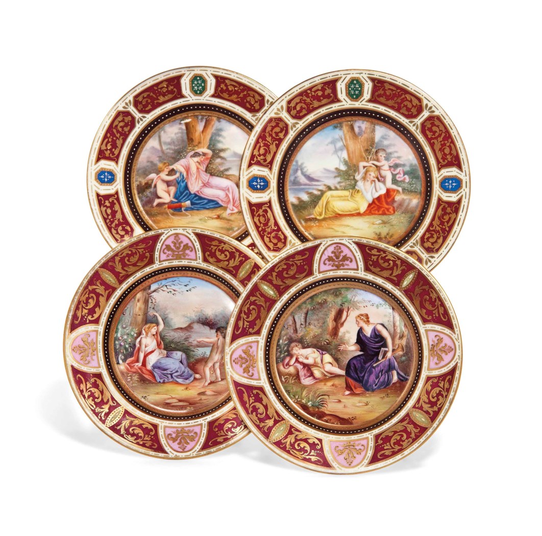 FOUR SMALL VIENNA-STYLE PLATES, EARLY 20TH CENTURY, OVERGLAZE BLUE AND ...