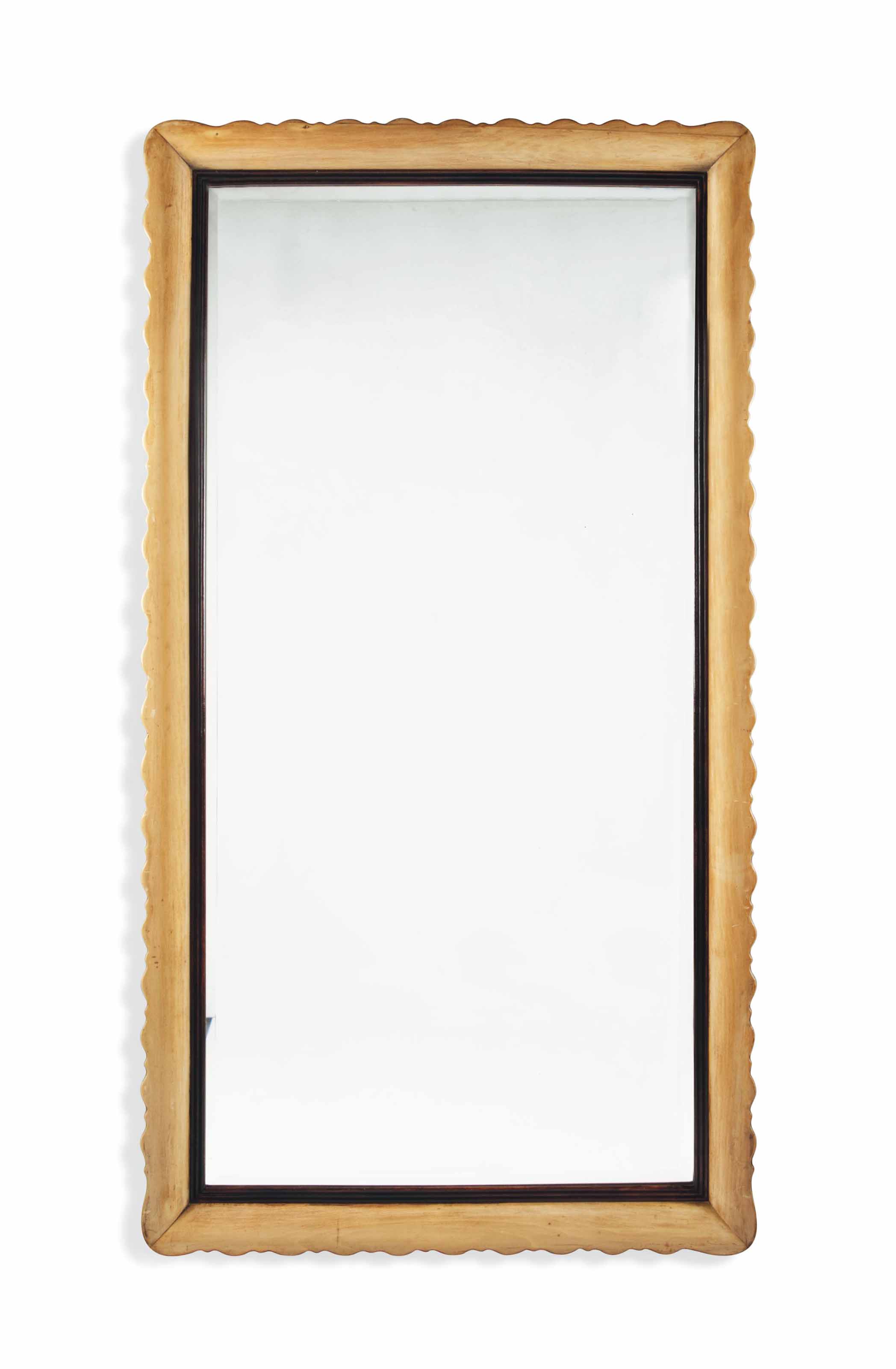 AN ITALIAN BEECH FRAMED WALL MIRROR