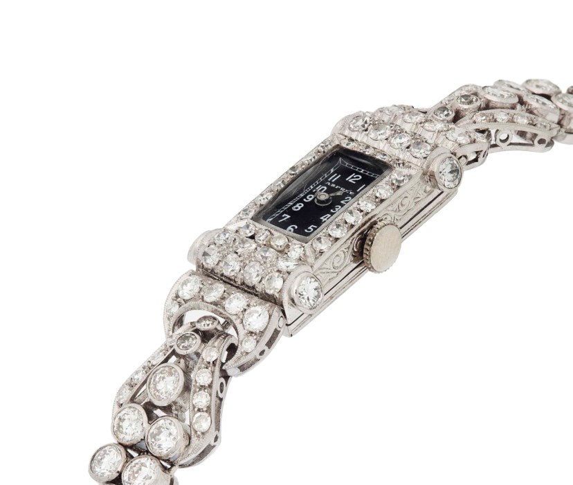 ASPREY. A LADY'S PLATINUM AND DIAMOND-SET ART DECO BRACELET WATCH
