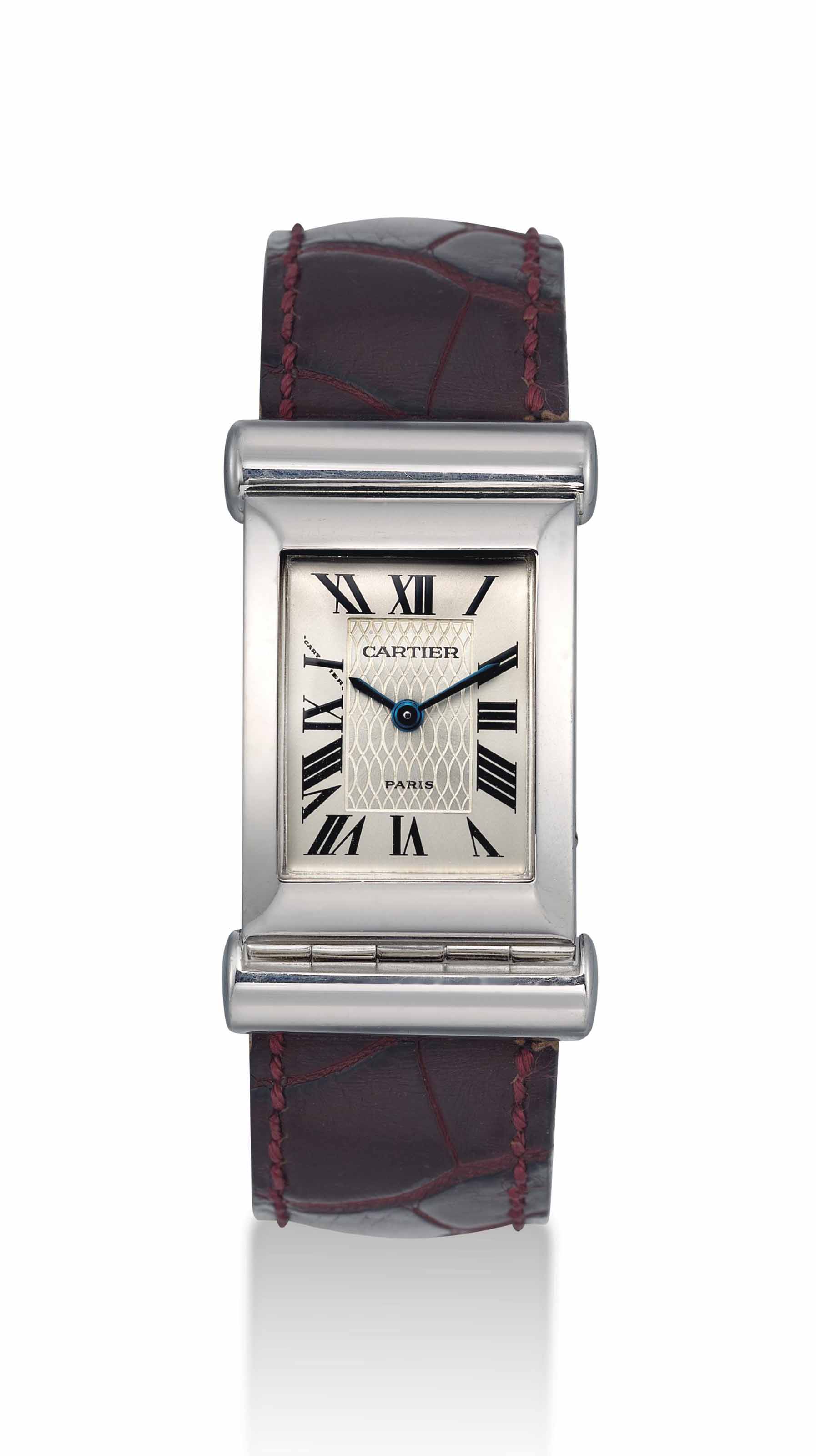 CARTIER. A FINE 18K WHITE GOLD LIMITED EDITION RECTANGULAR WRISTWATCH