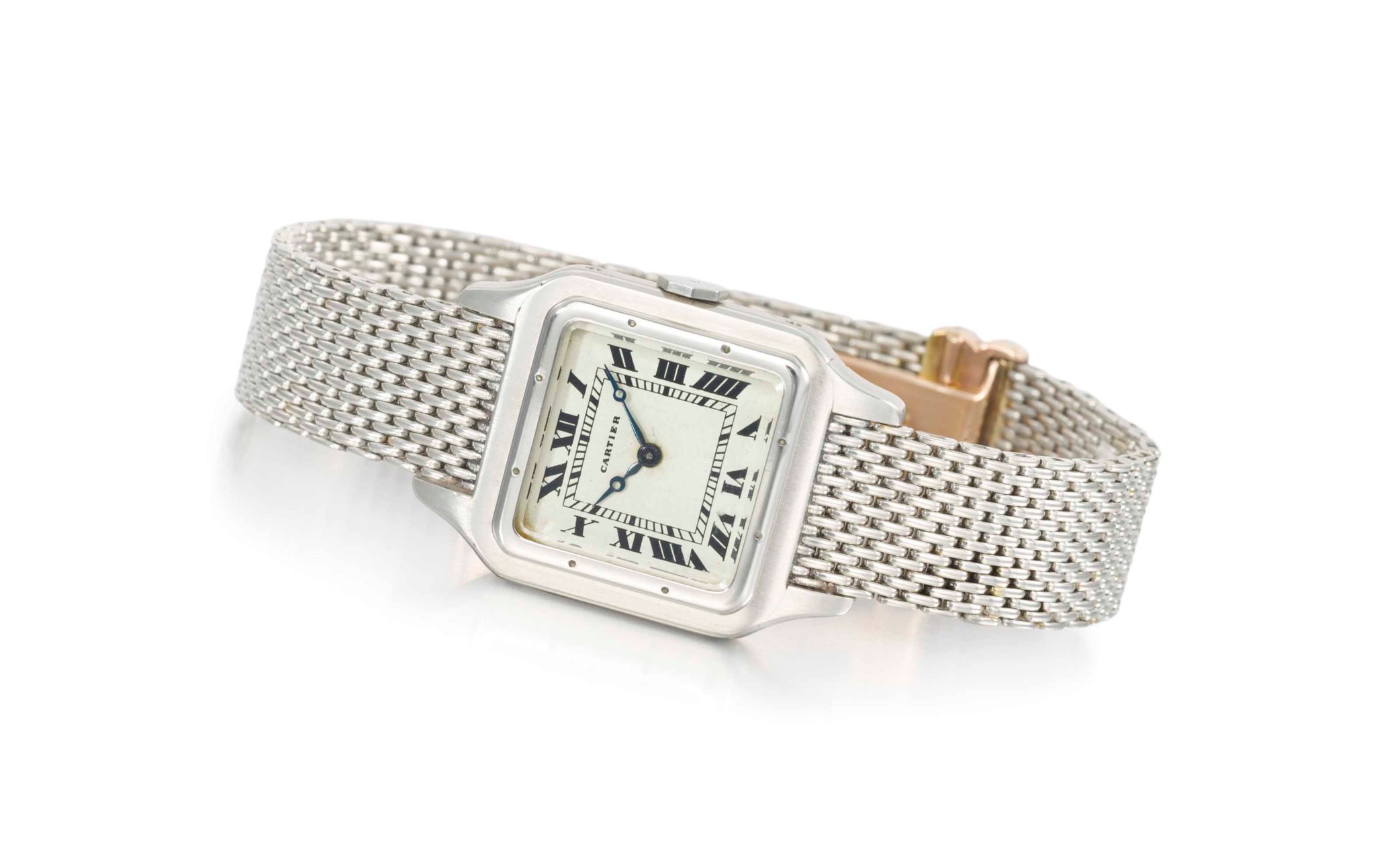 Cartier. A very rare, heavy and attractive platinum square-shaped ...