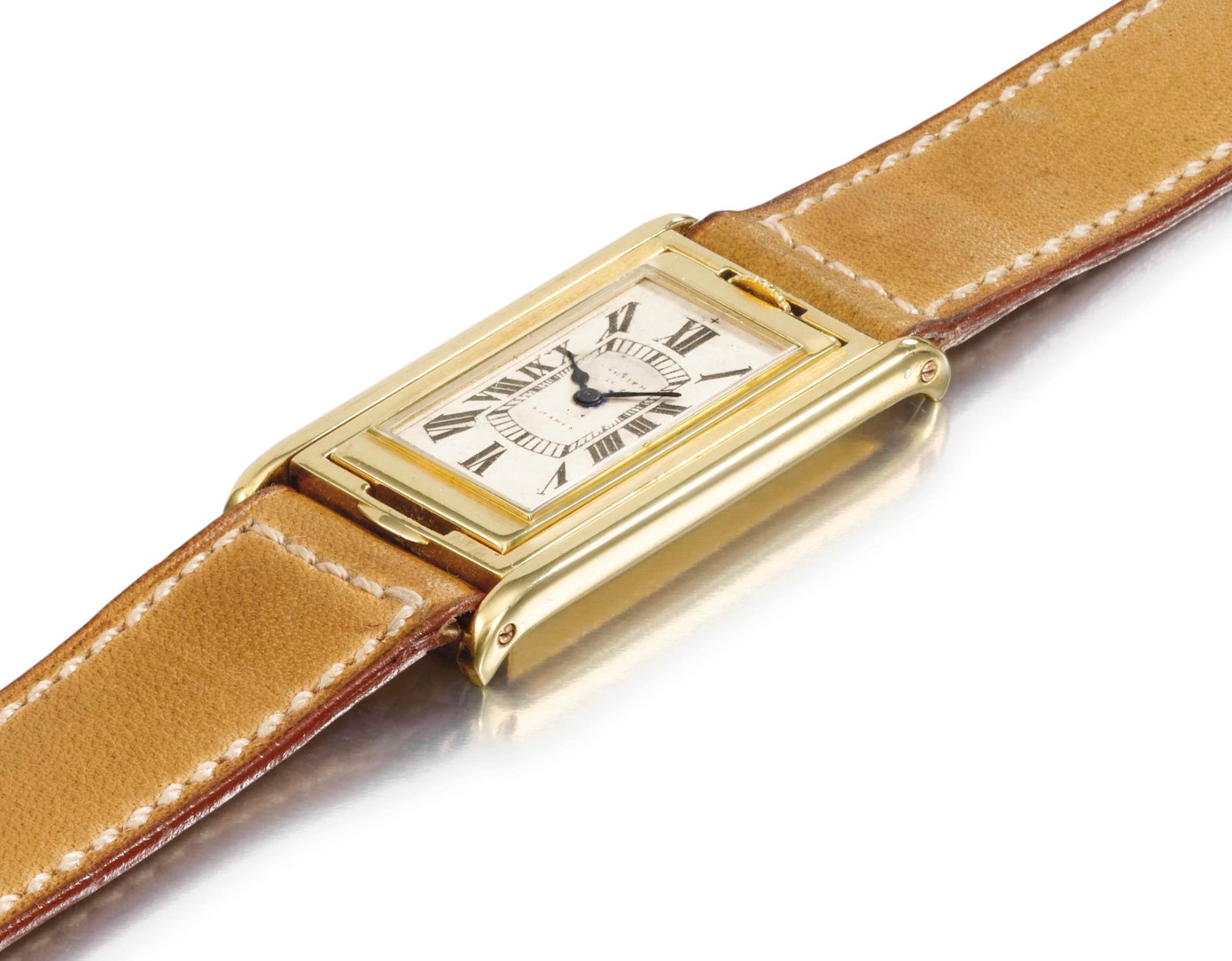 Cartier. A very rare 18k Gold Rectangular Reversible Wristwatch ...