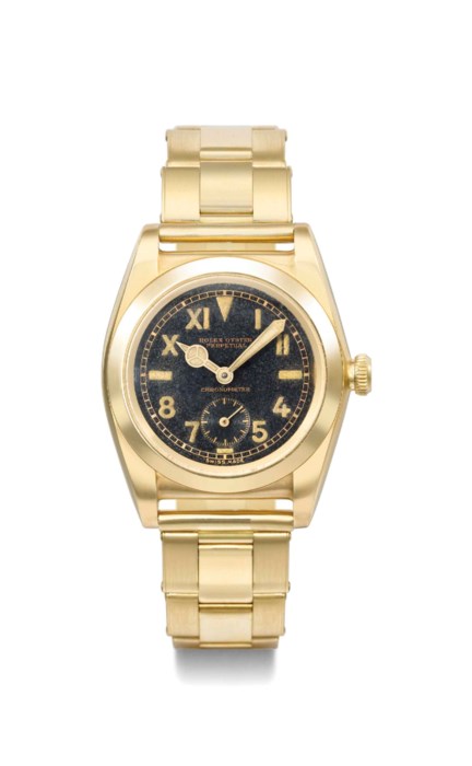 Rolex. A very rare and attractive 18K gold automatic bubble back ...