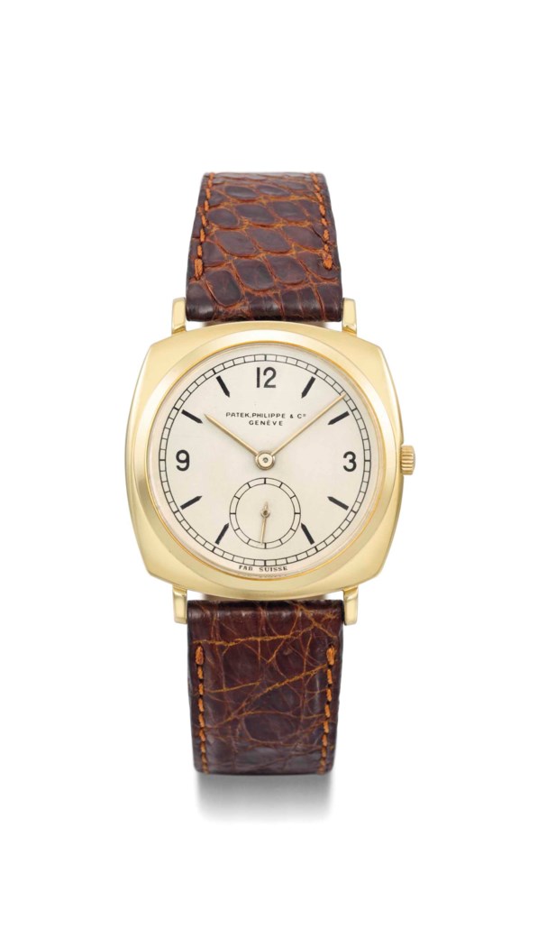 Patek Philippe. An 18K gold self-winding cushion-shaped wristwatch ...