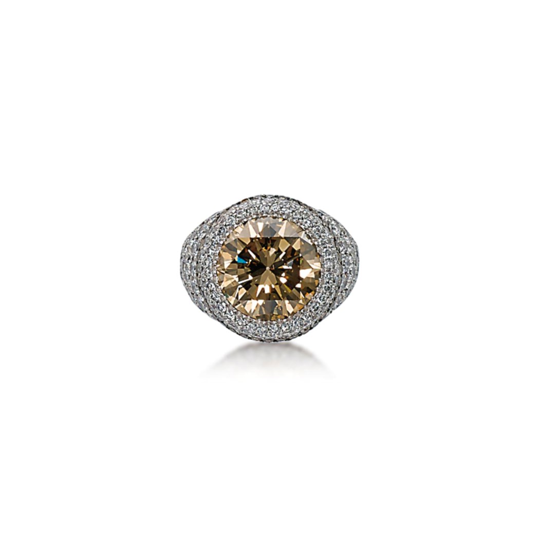 A COLOURED DIAMOND AND DIAMOND RING, BY ADLER
