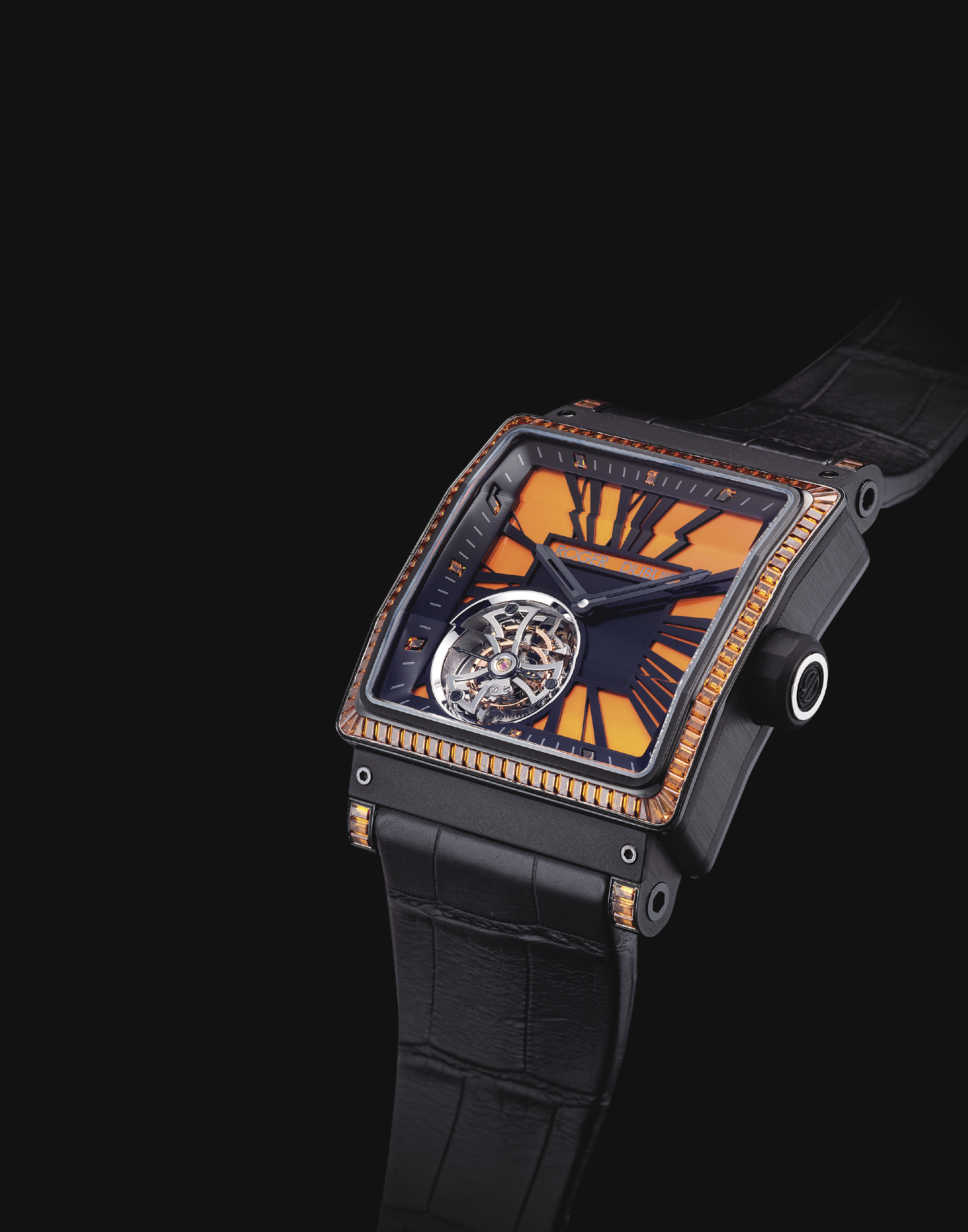 ROGER DUBUIS. A FINE AND RARE TITANIUM AND SPESSARTITE GARNET-SET ...