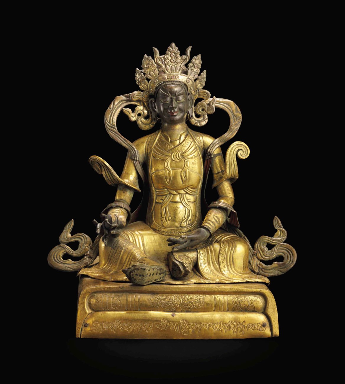 A repousse gilt bronze figure of a celestial guardian , TIBETO-CHINESE ...