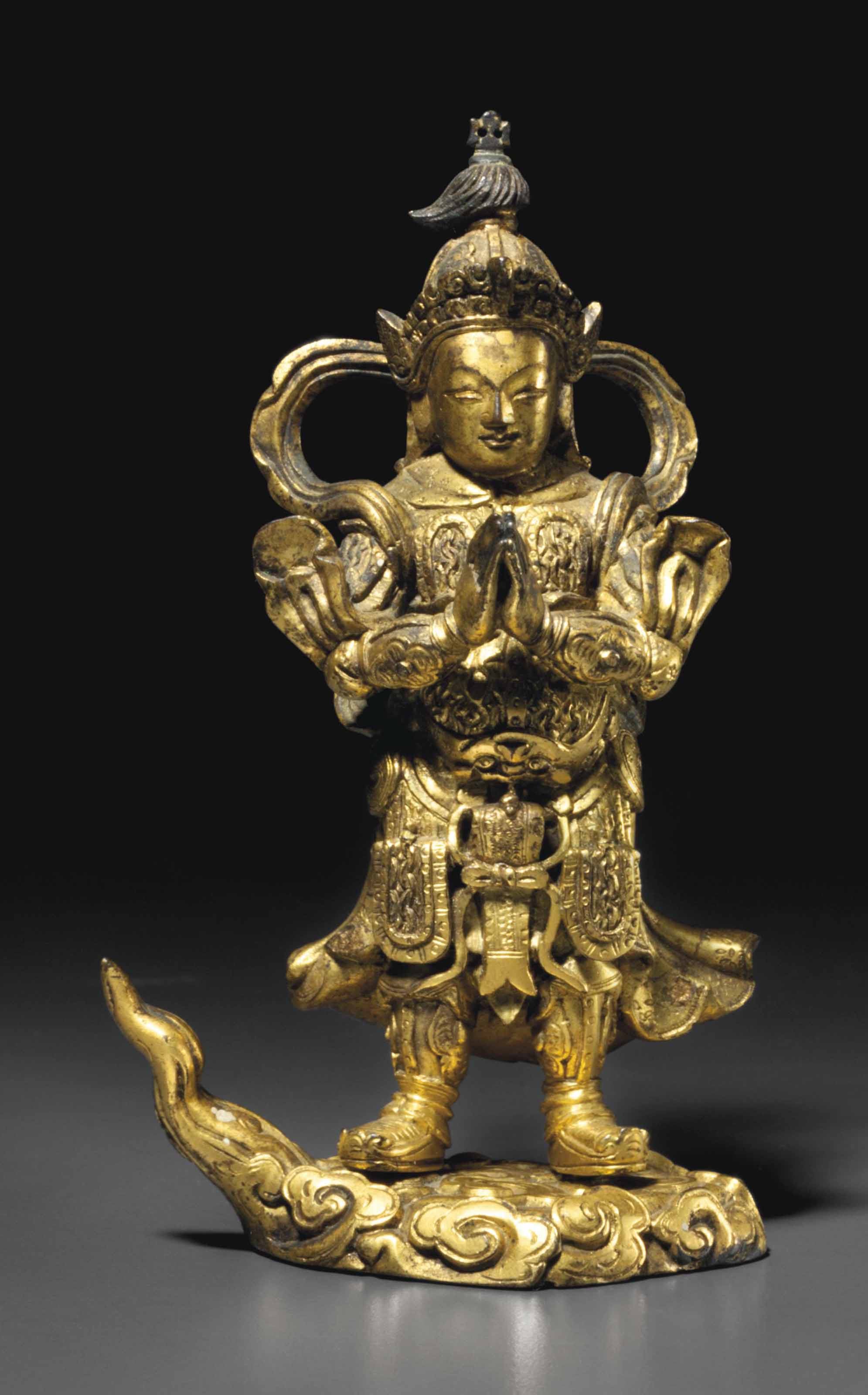 A SMALL FINELY CAST GILT-BRONZE FIGURE OF WEITUO