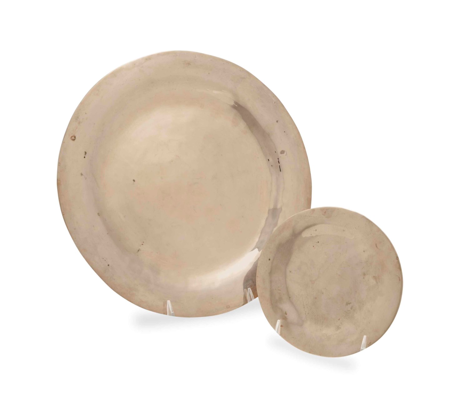 A SET OF HAMMERED METAL PLACE PLATES, , 20TH CENTURY, | Christie's