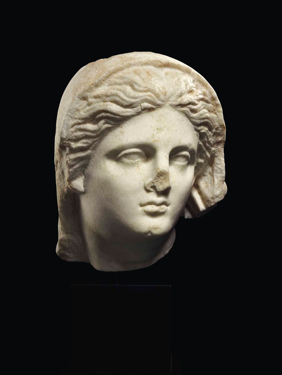 A GREEK MARBLE VEILED FEMALE HEAD , CLASSICAL PERIOD, CIRCA 4TH CENTURY ...