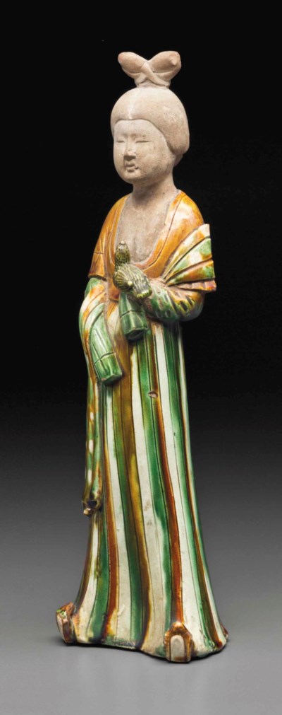 A SANCAI -GLAZED POTTERY FIGURE OF A STANDING LADY , TANG DYNASTY (AD ...