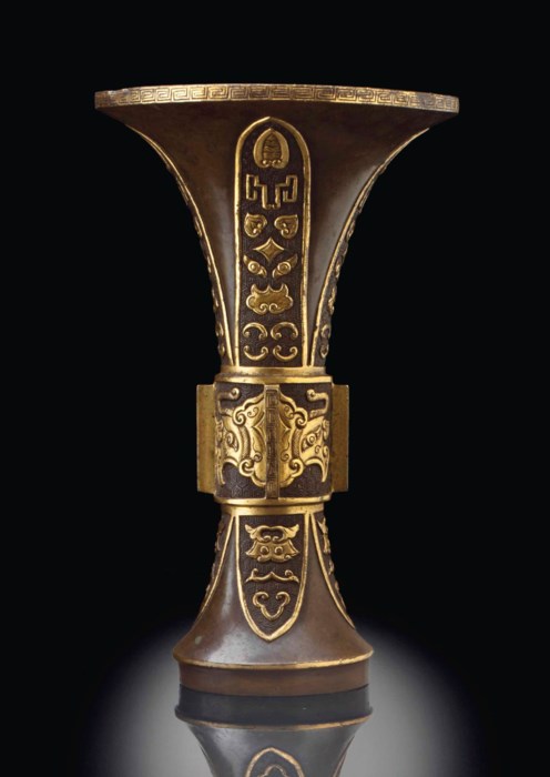 A SMALL PARCEL-GILT BRONZE GU-FORM VASE, 16TH-17TH CENTURY | Christie's