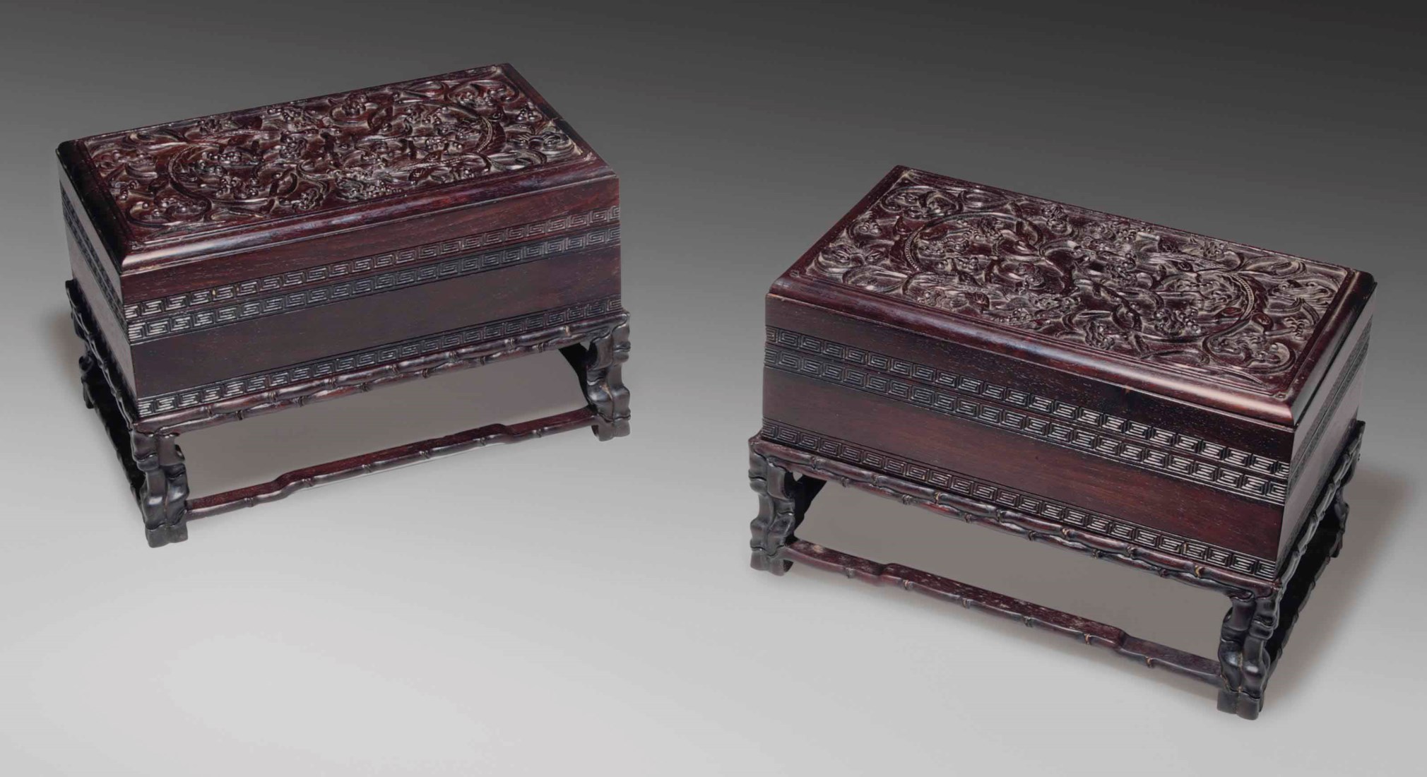 A PAIR OF ZITAN RECTANGULAR BOXES ON STANDS | Christie's