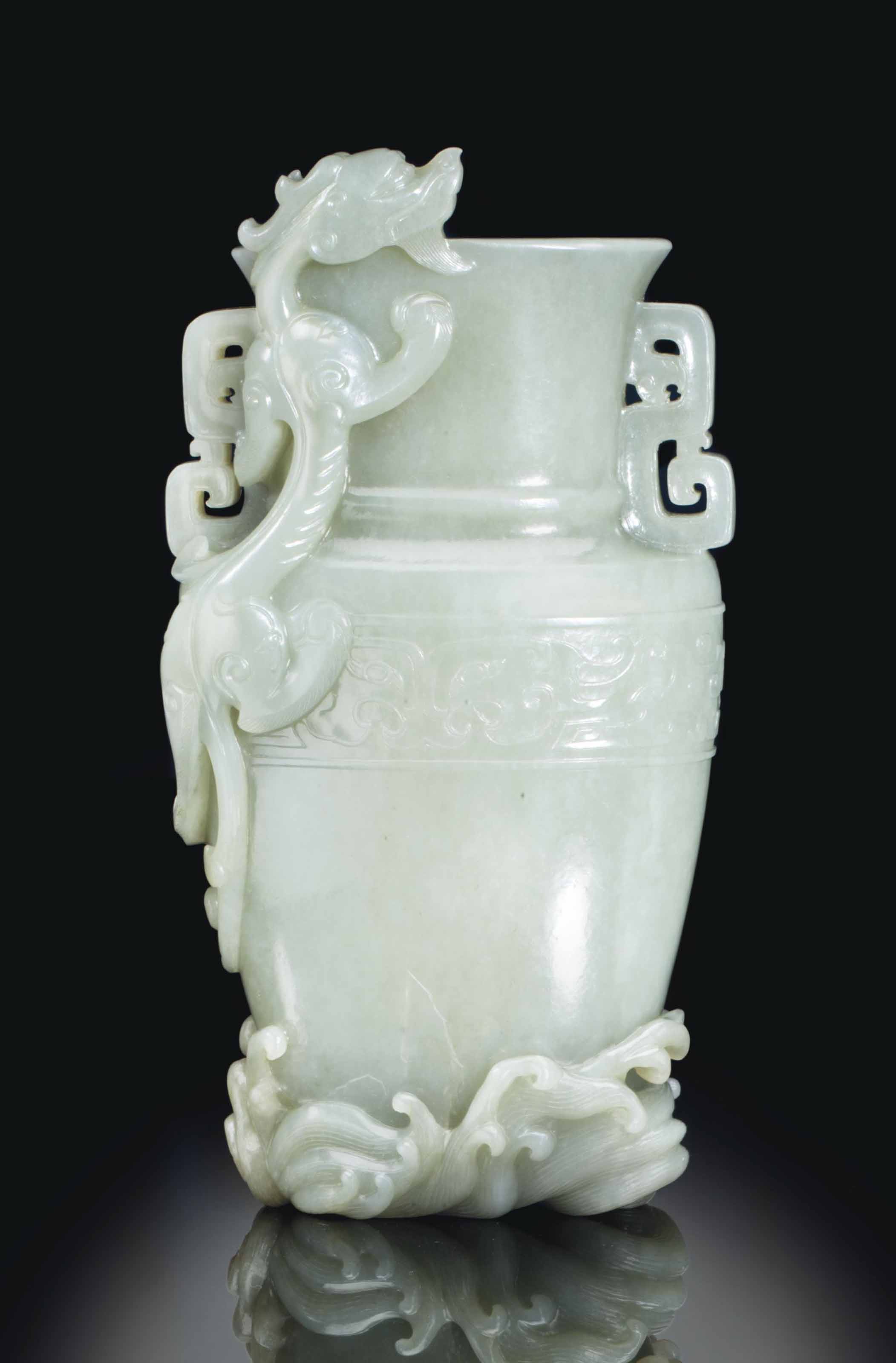 A PALE GREYISH-GREEN JADE VASE