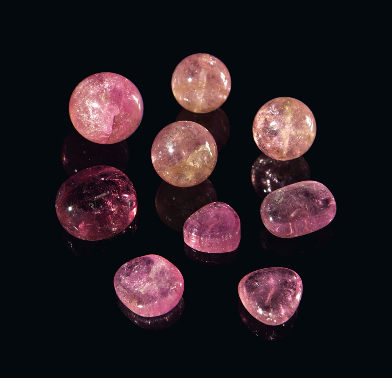 NINE CHINESE PINK TOURMALINE CARVINGS,