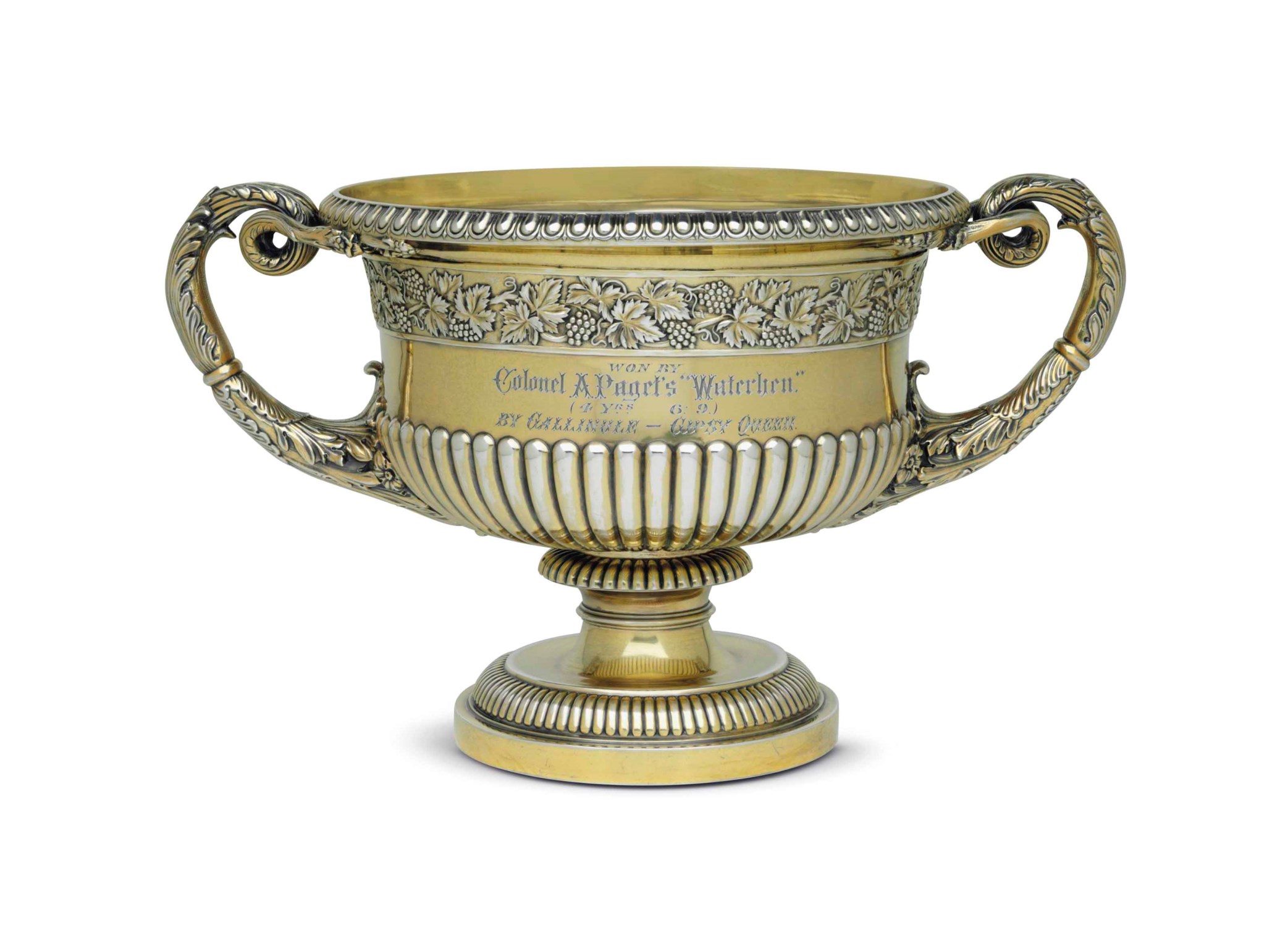 A REGENCY SILVER-GILT TROPHY CUP, MARK OF WILLIAM ELLIOTT, LONDON, 1818 ...