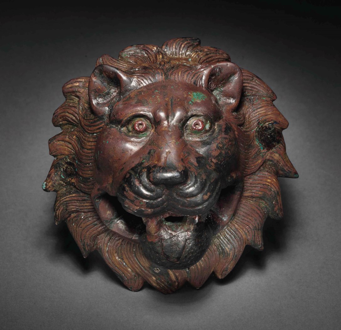 A ROMAN BRONZE LION-HEAD ATTACHMENT, CIRCA 2ND CENTURY A.D. | Christie's