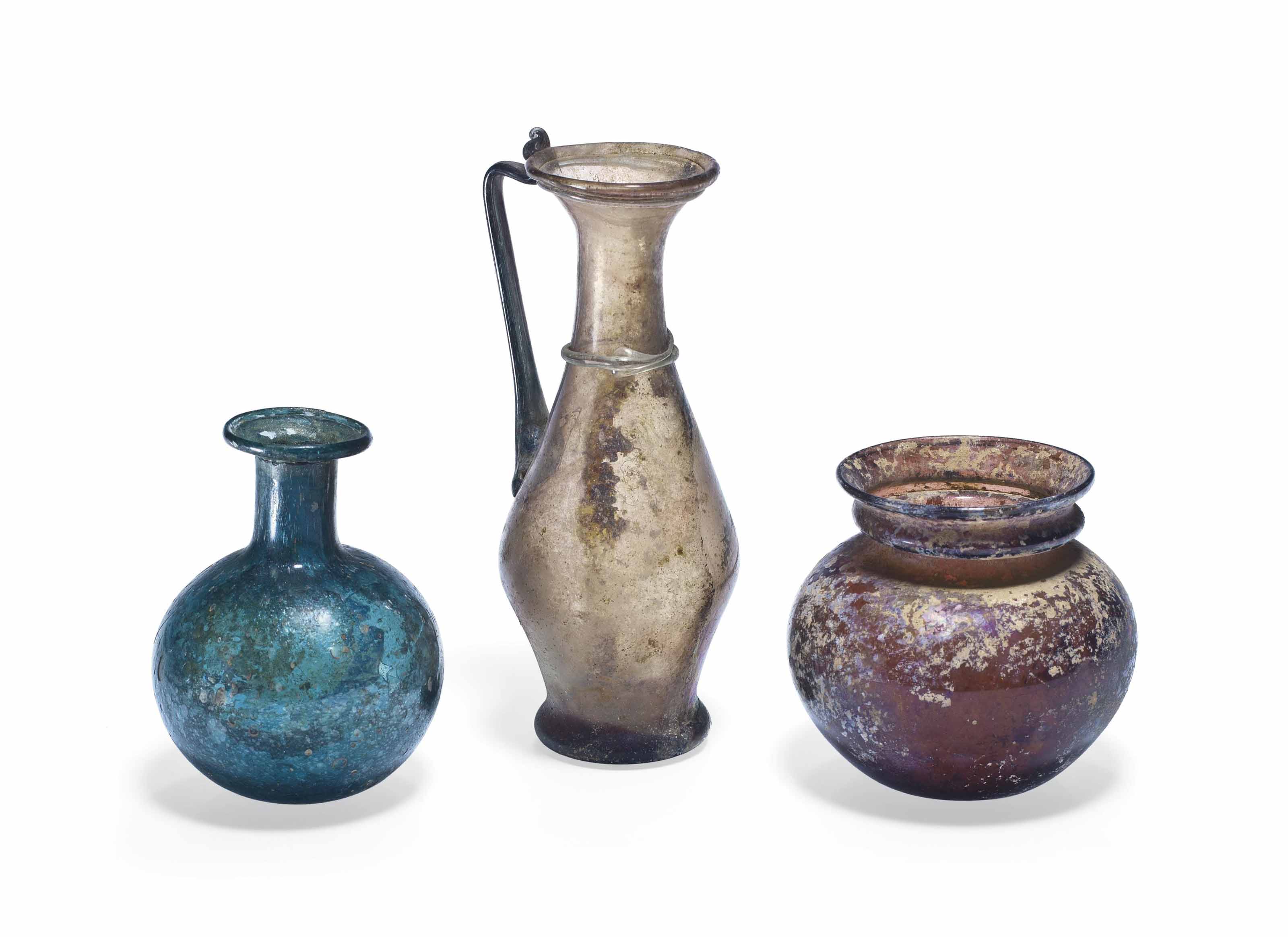 THREE ROMAN GLASS VESSELS