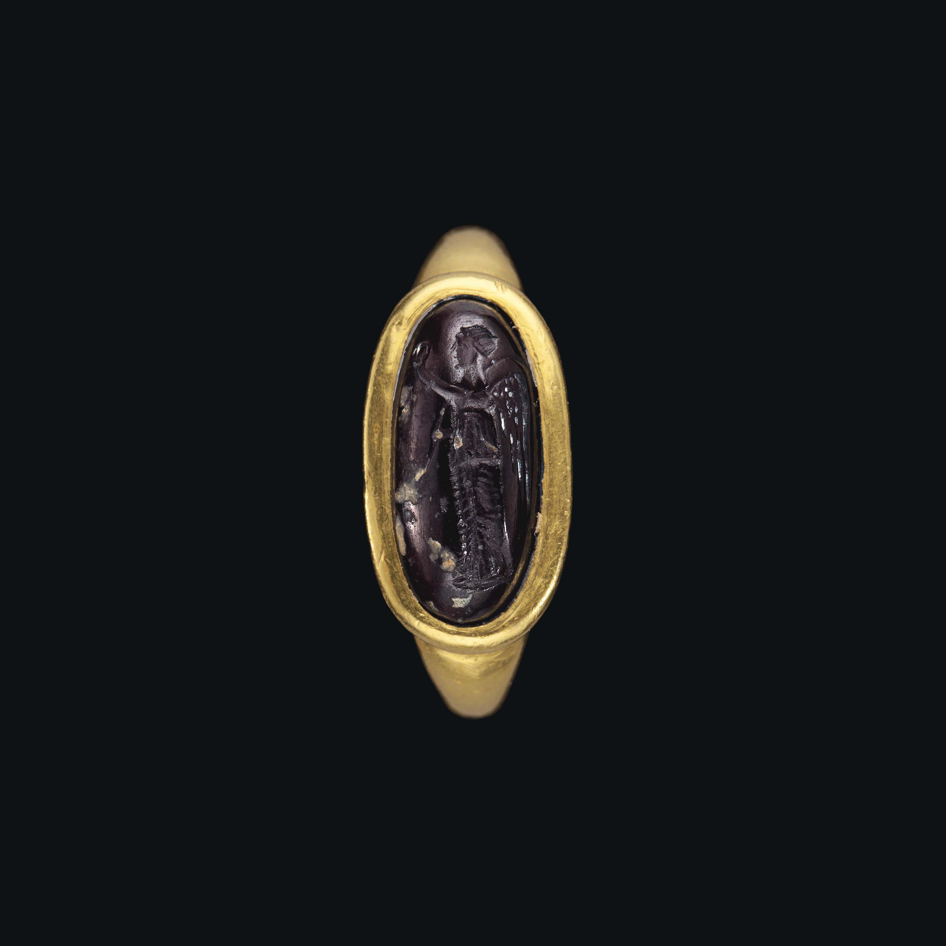 A GREEK GOLD FINGER RING, CLASSICAL PERIOD, CIRCA 4TH CENTURY B.C ...