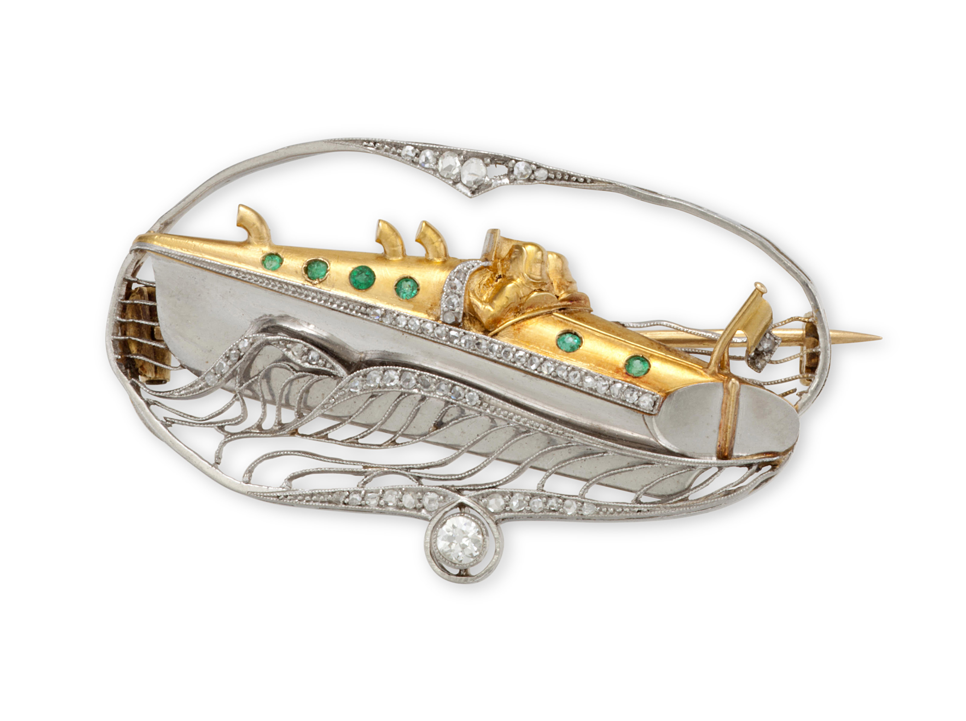 AN ART DECO DIAMOND AND EMERALD BOAT BROOCH, | Christie’s