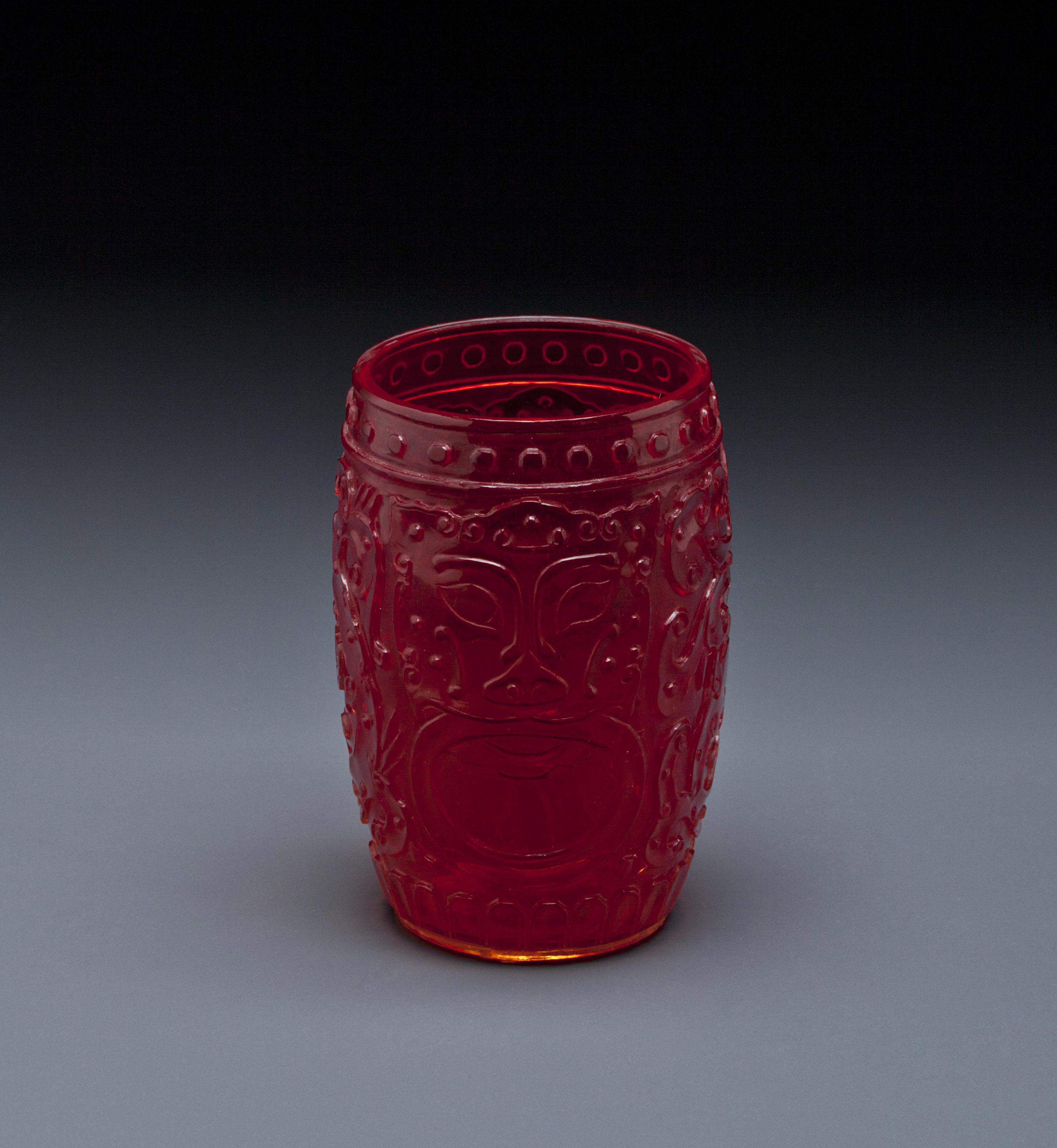 A RED GLASS BARREL-FORM CUP, 18TH-19TH CENTURY | Christie’s