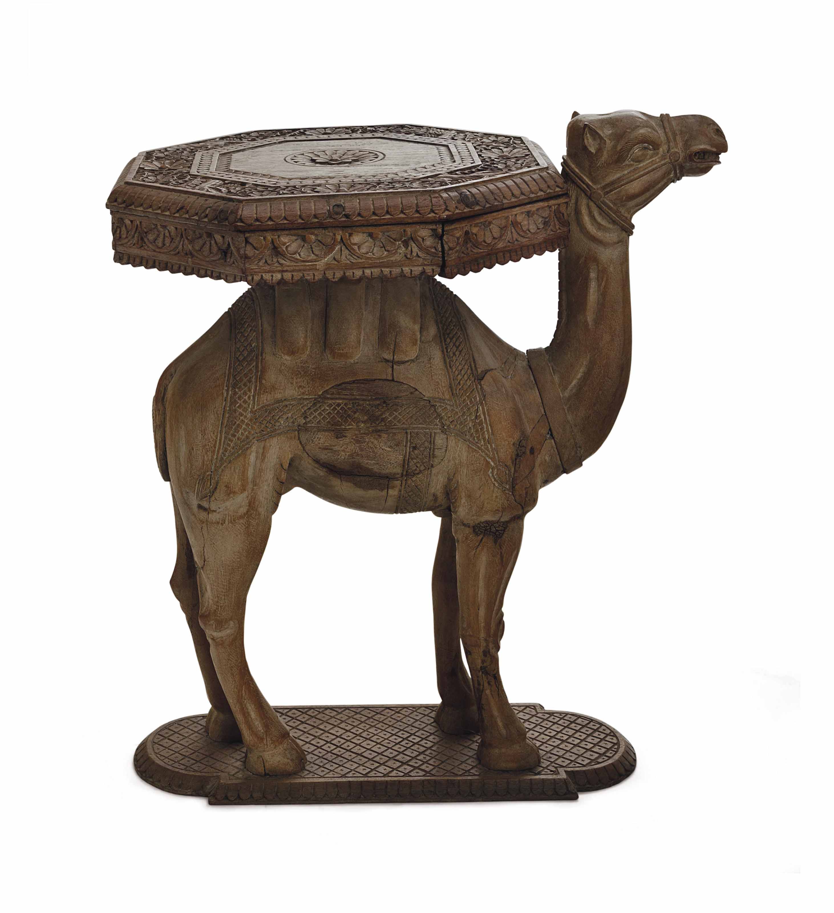 A CARVED CAMEL-FORM OCCASIONAL TABLE