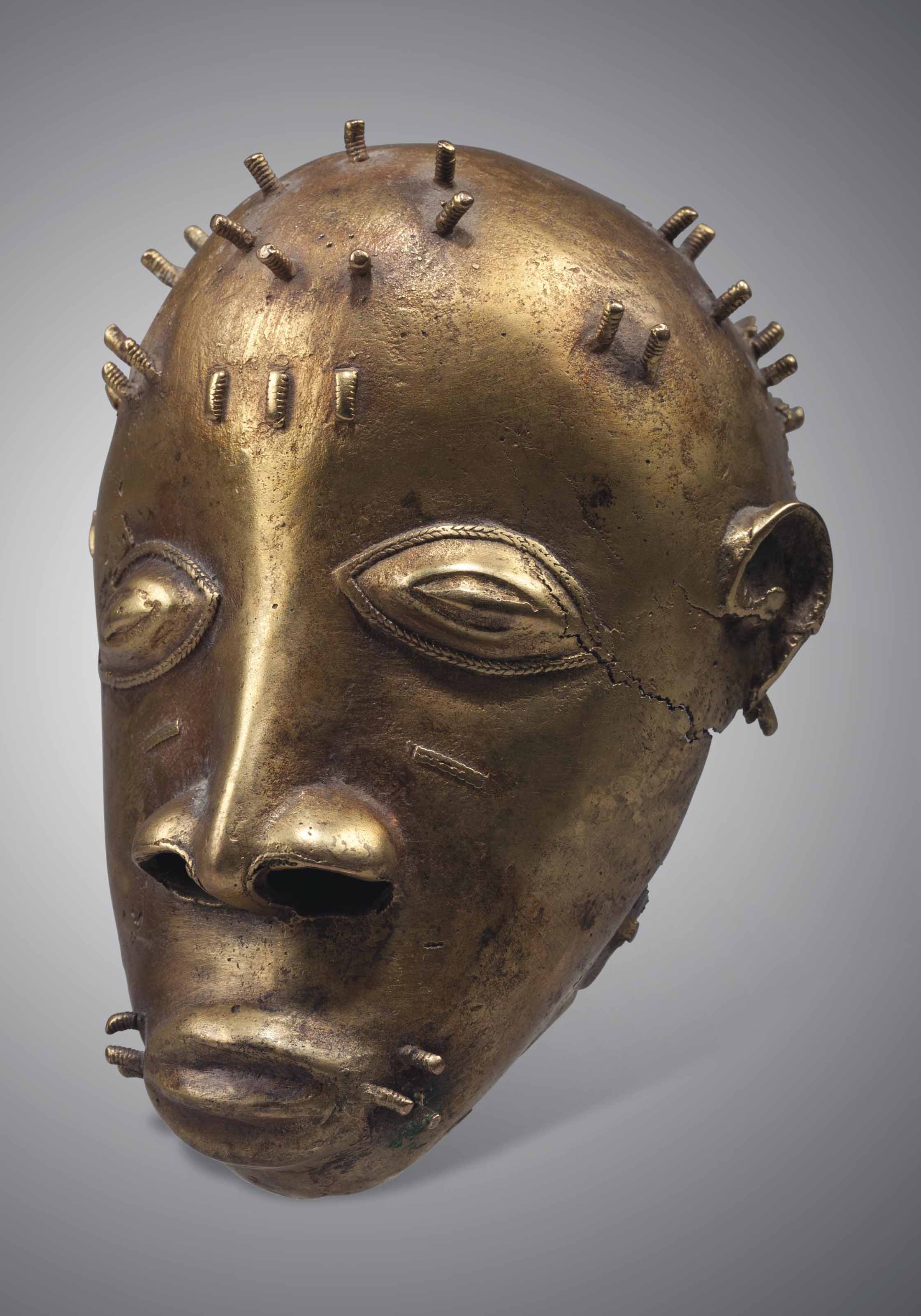 Tête en bronze Akan Bronze Akan head , GHANA | Christie's
