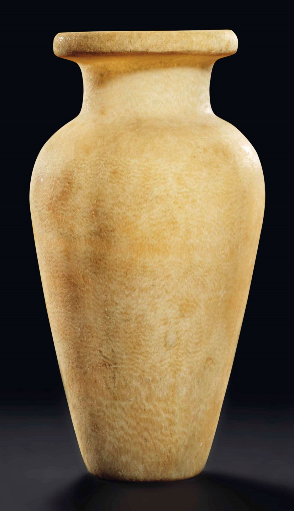 AN EGYPTIAN ALABASTER JAR
