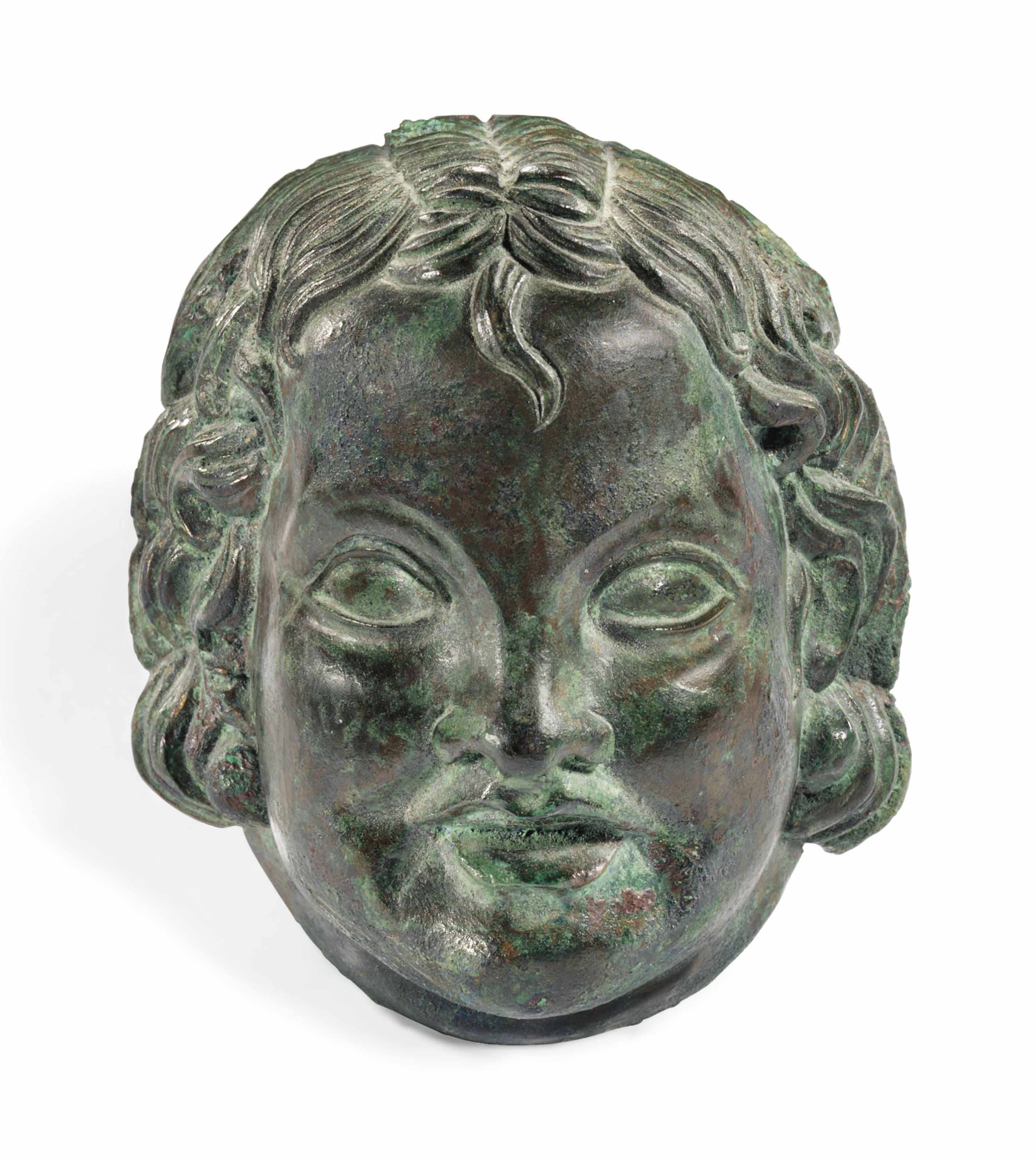 A ROMAN BRONZE HEAD OF CUPID