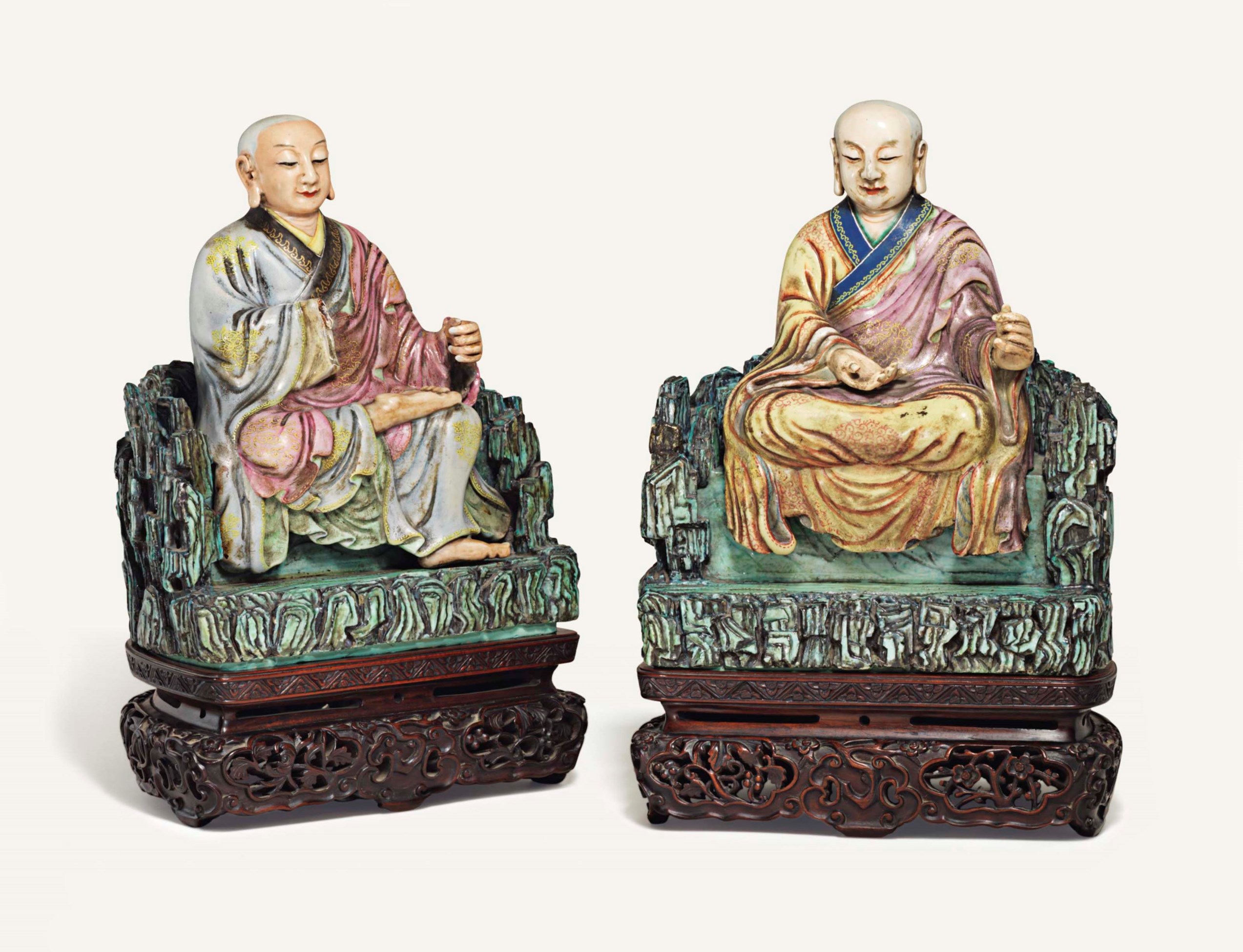 TWO FAMILLE ROSE SEATED FIGURES OF LUOHAN , 18TH CENTURY | Christie's